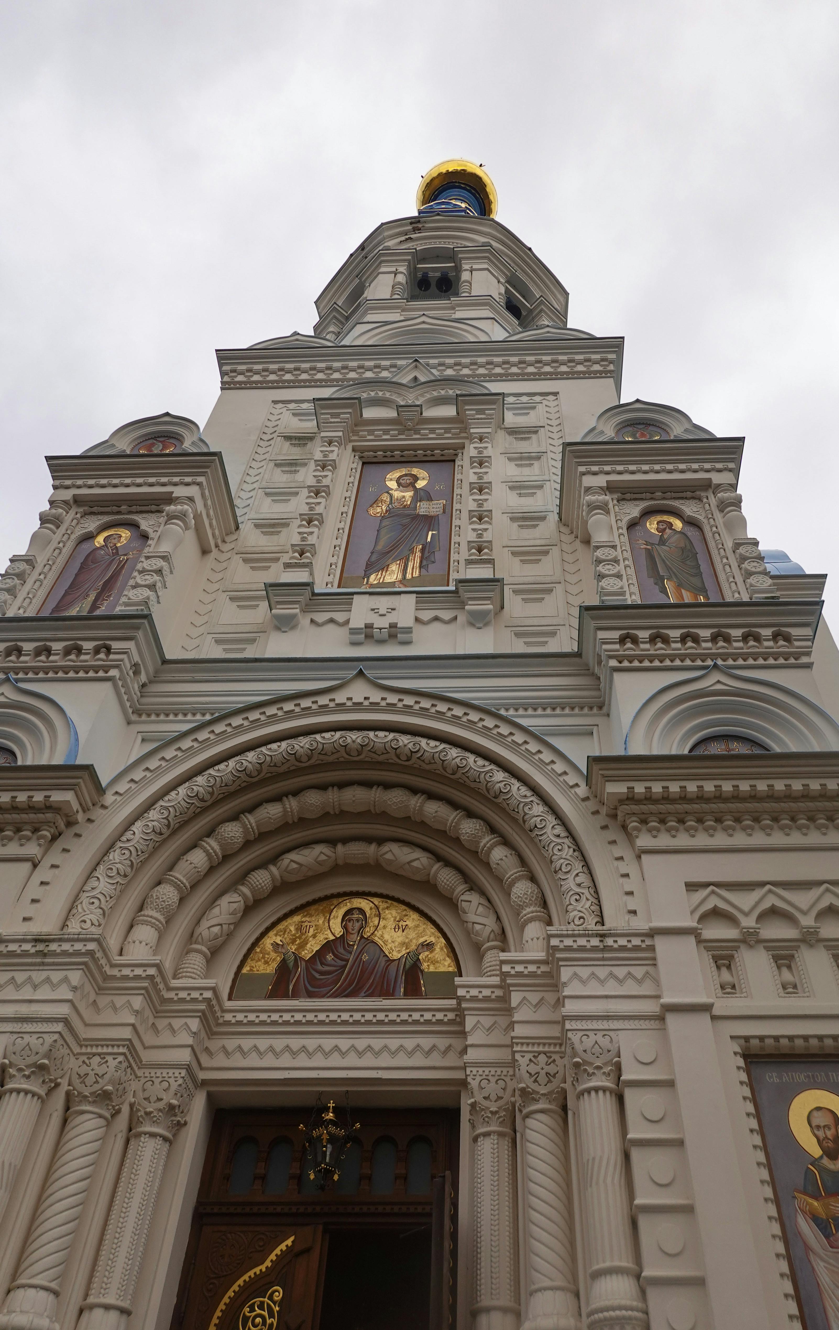 Facade details of Orthodox church under cloudy sky · Free Stock Photo