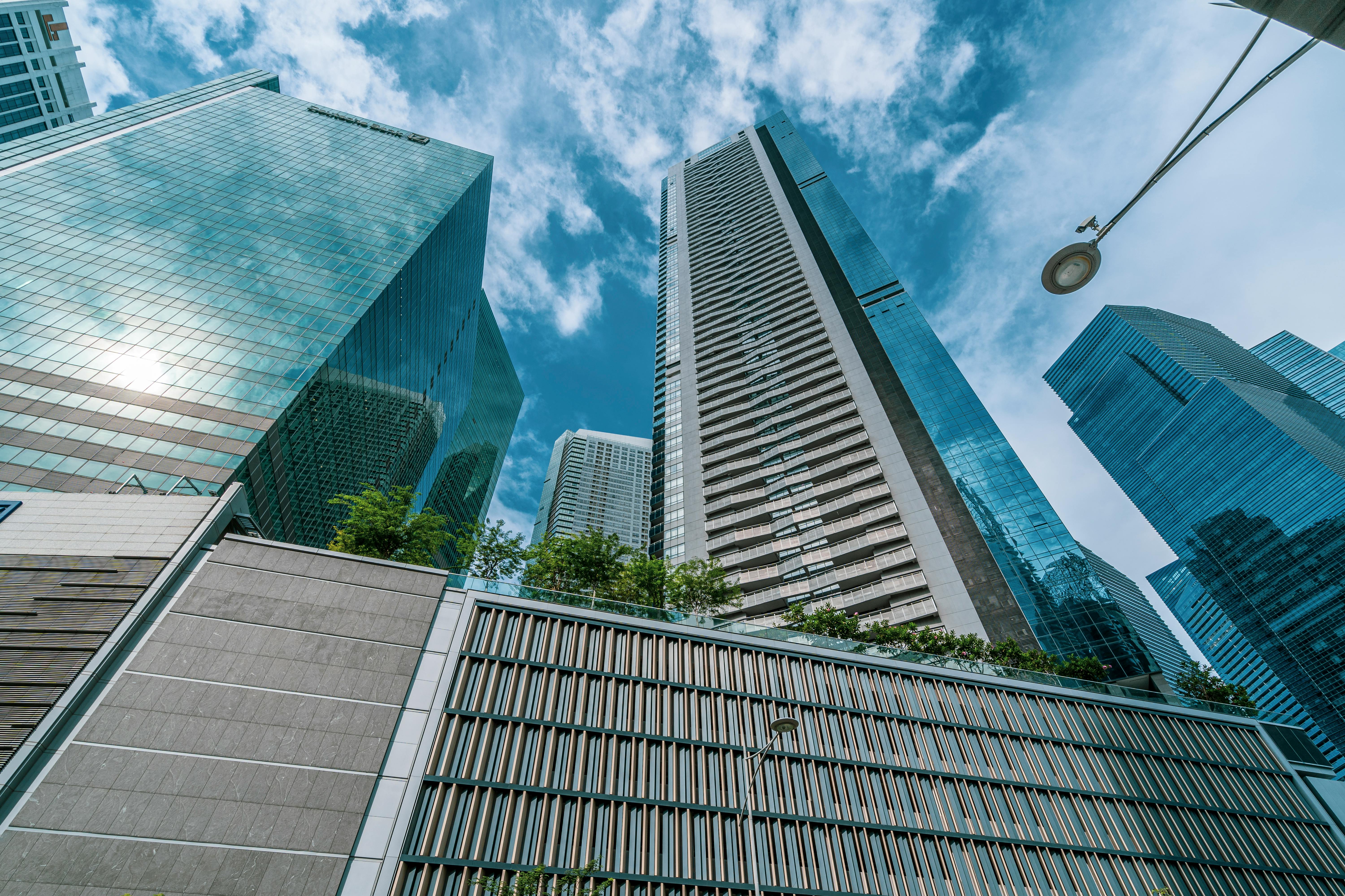 Low Angle Shot of Modern Skyscrapers in Singapore · Free Stock Photo