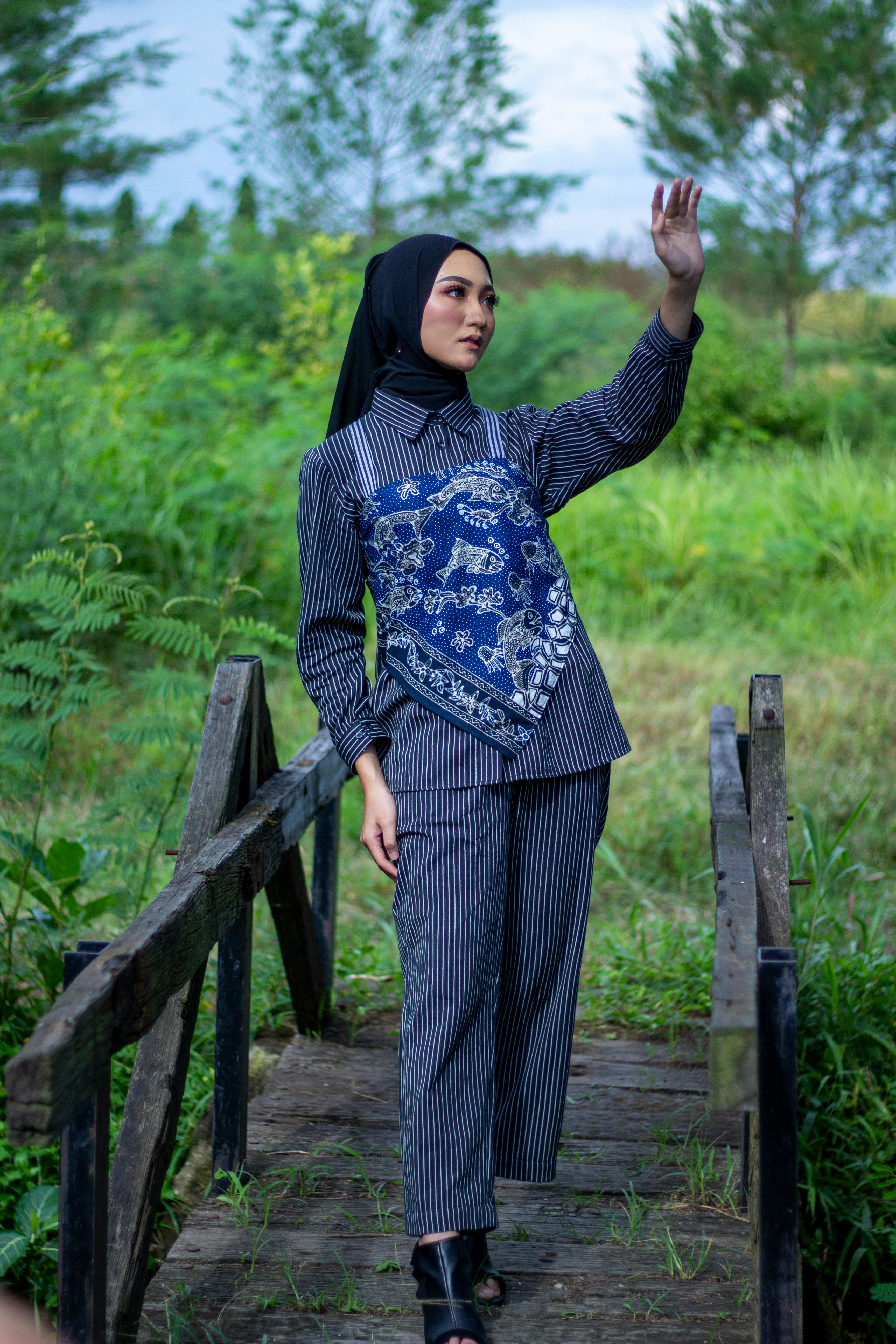 Woman in Hijab and Raincoat Standing with Transparent Umbrella · Free ...
