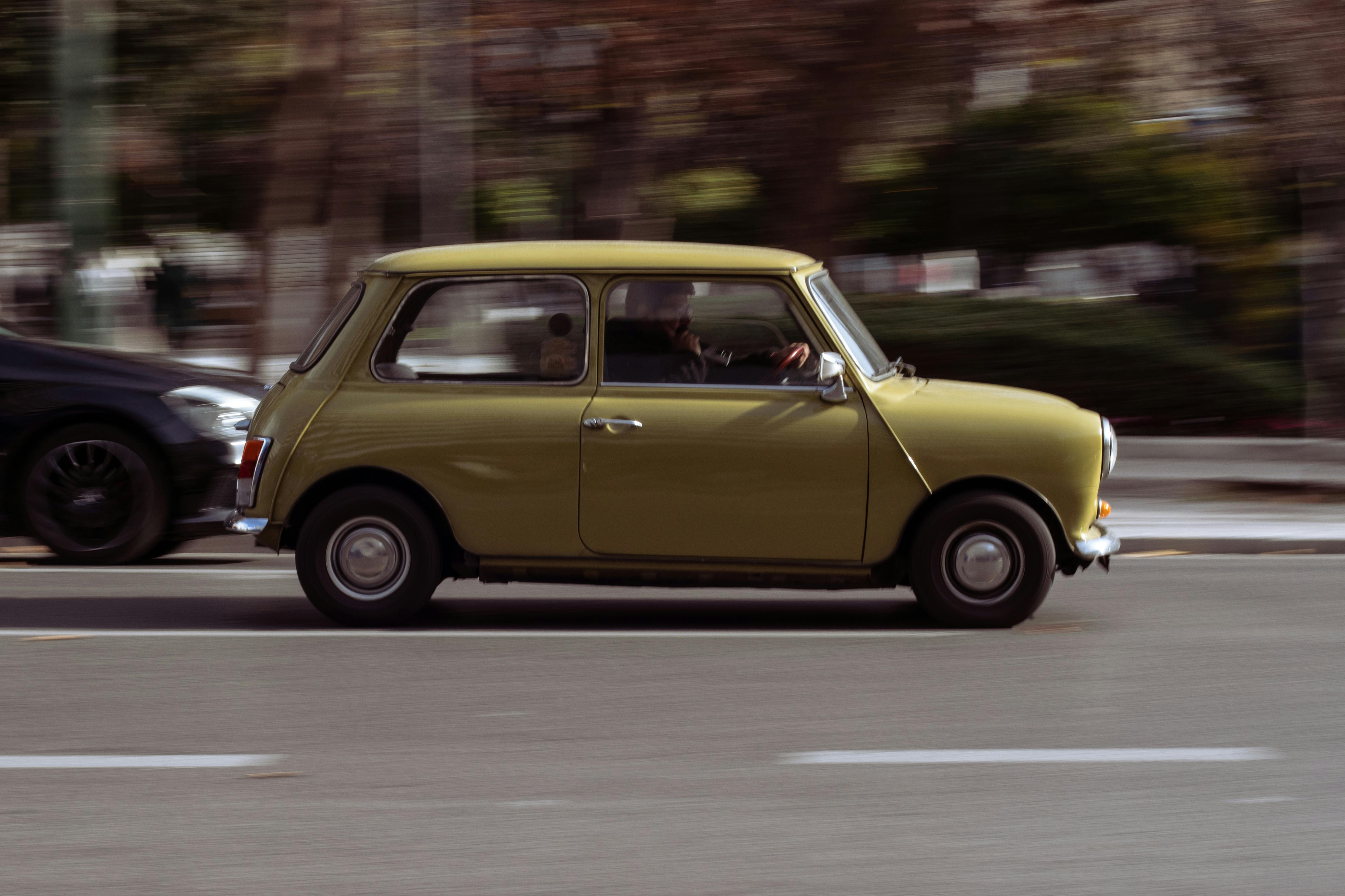 Yellow Car on the Road · Free Stock Photo