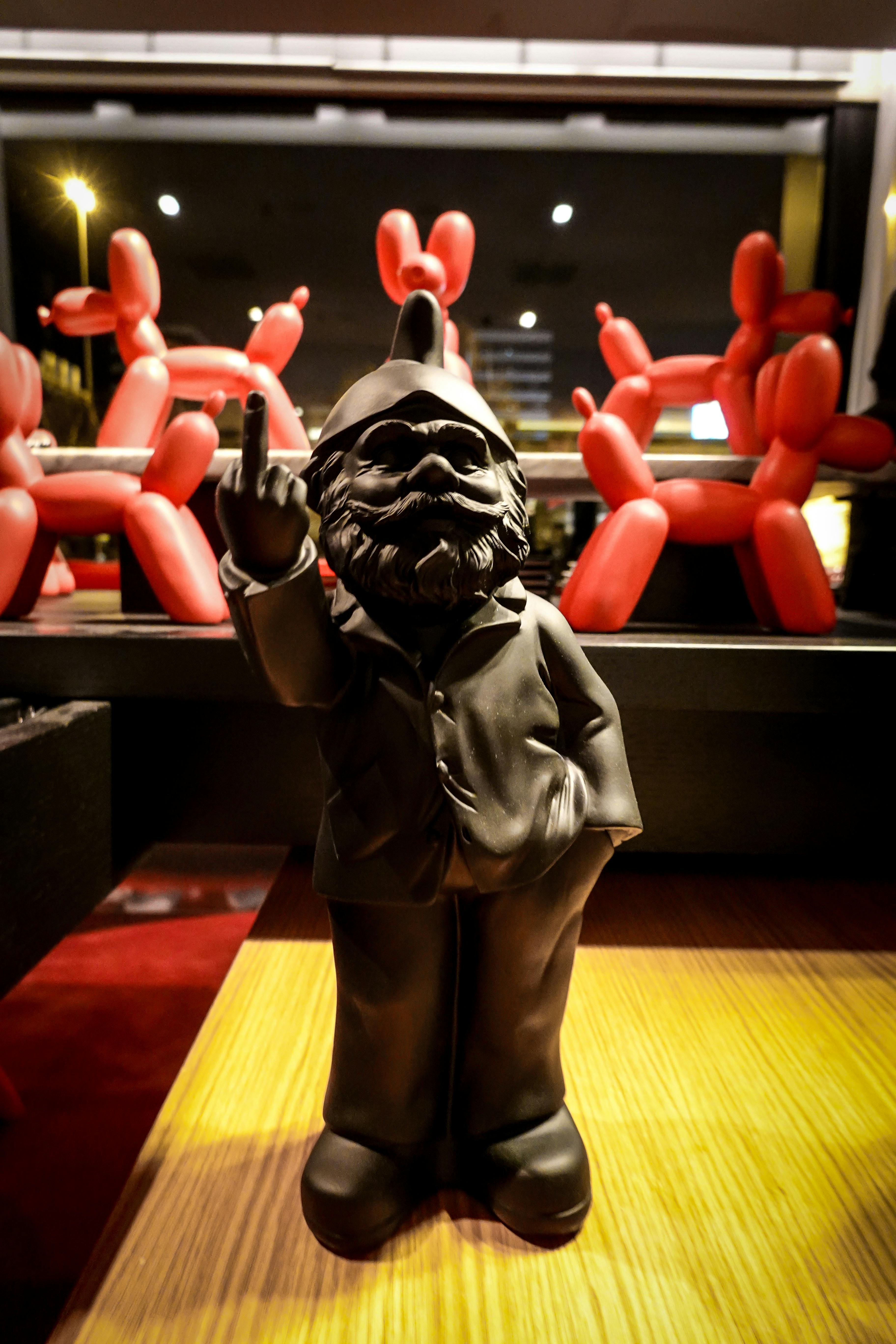 Grayscale Photo of Woman Raising Her Middle Finger · Free Stock Photo