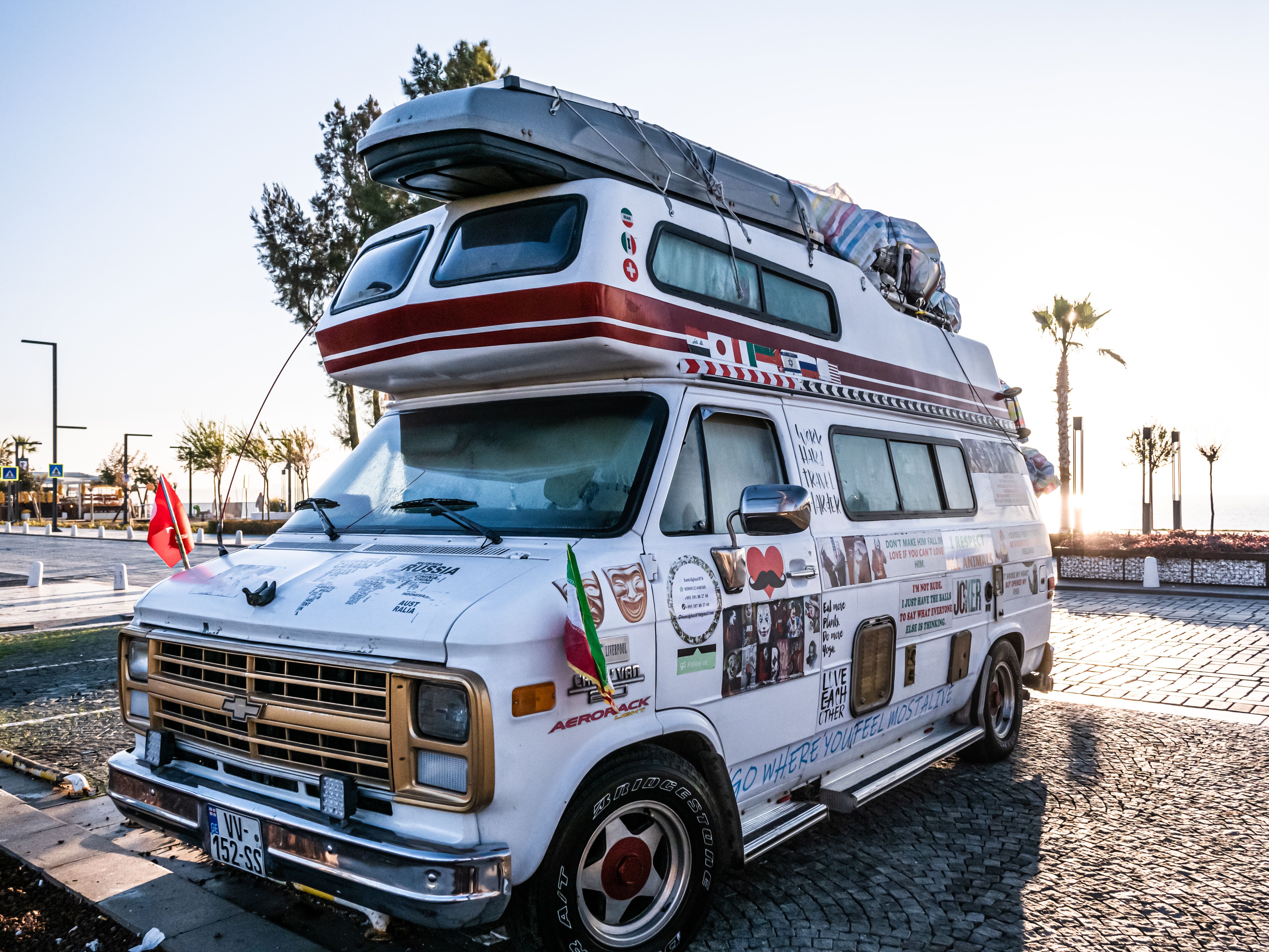 White Van Parked Beside a Street · Free Stock Photo