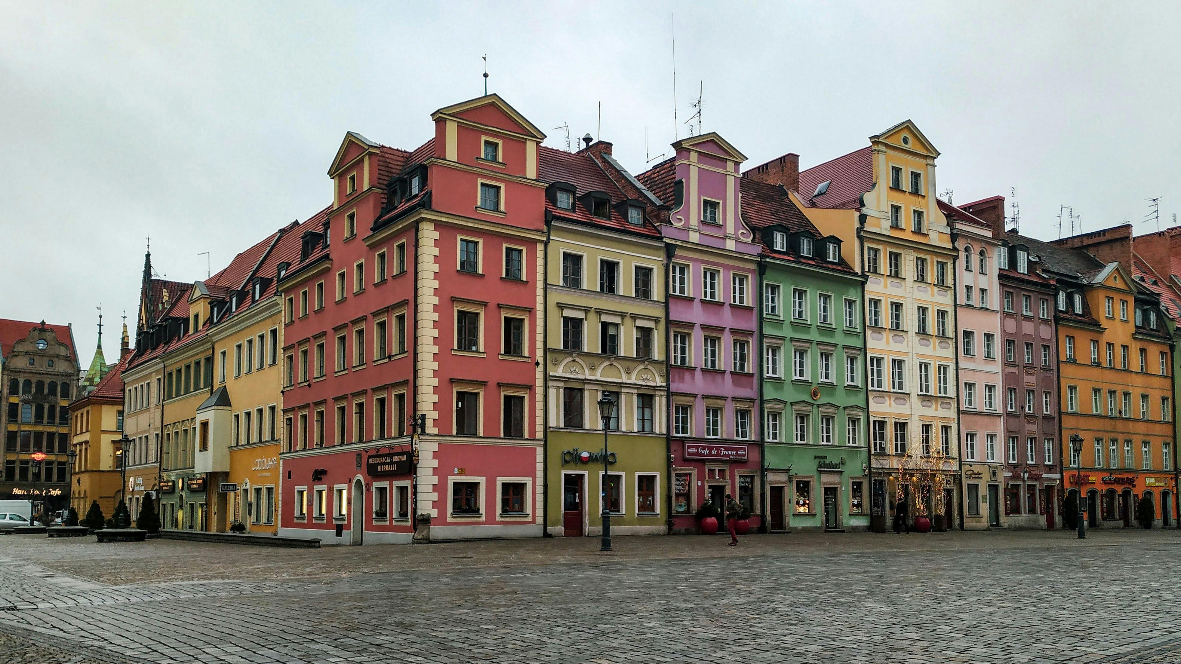 A row of colorful buildings in a city · Free Stock Photo