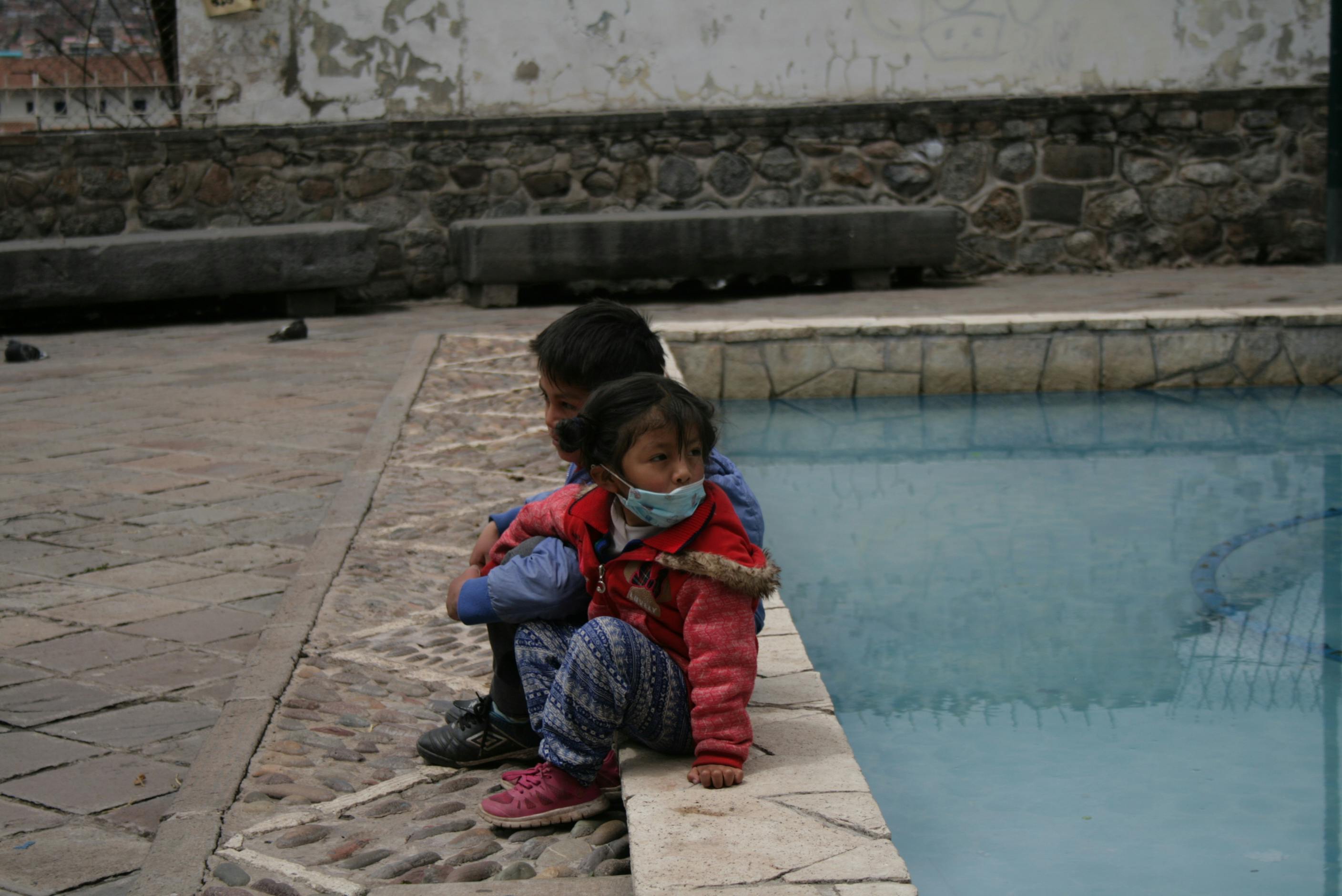 Dark Photo of a Man Standing against a Waterfall · Free Stock Photo