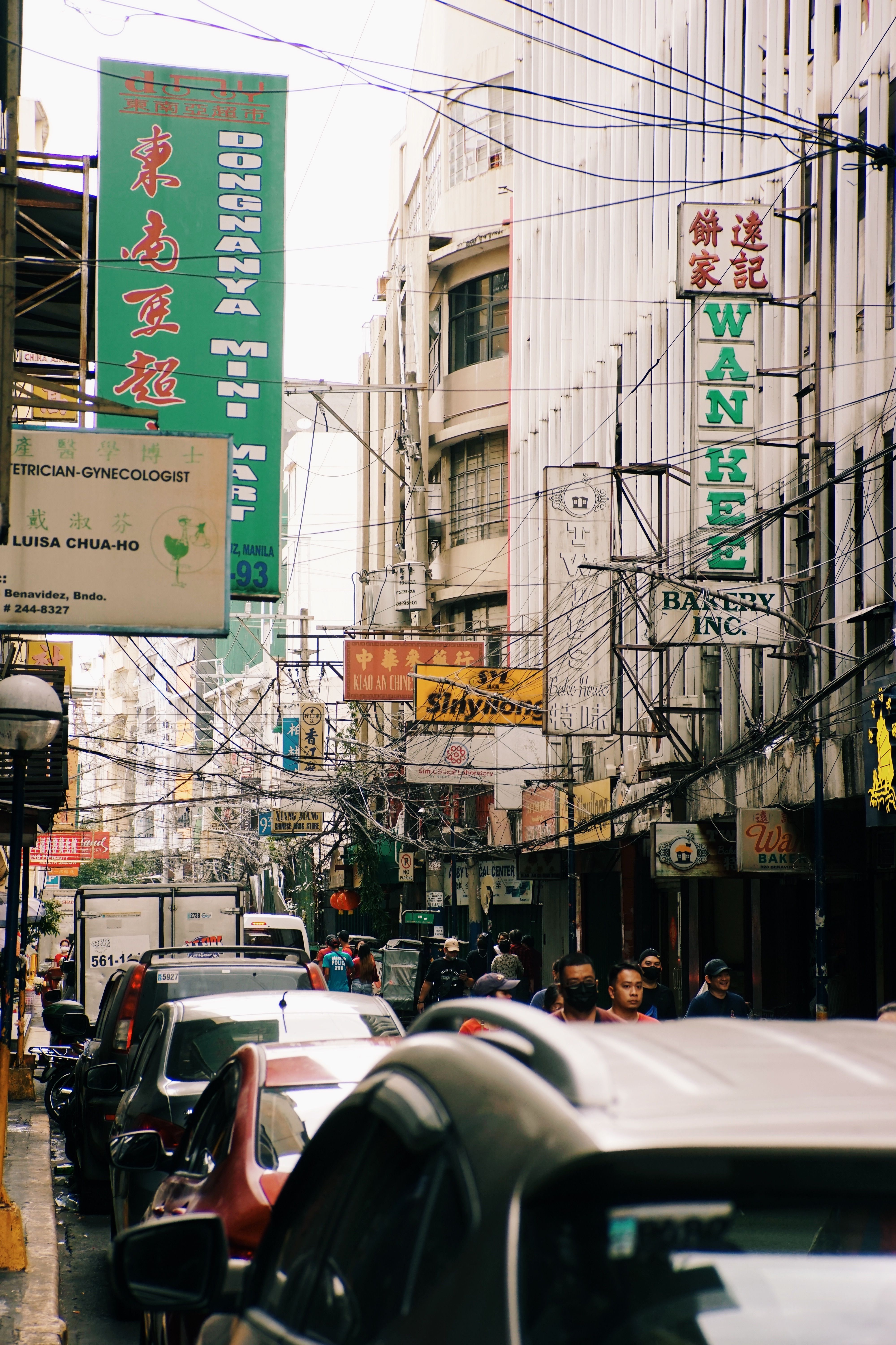 Photo of a Busy City Street with Signs · Free Stock Photo
