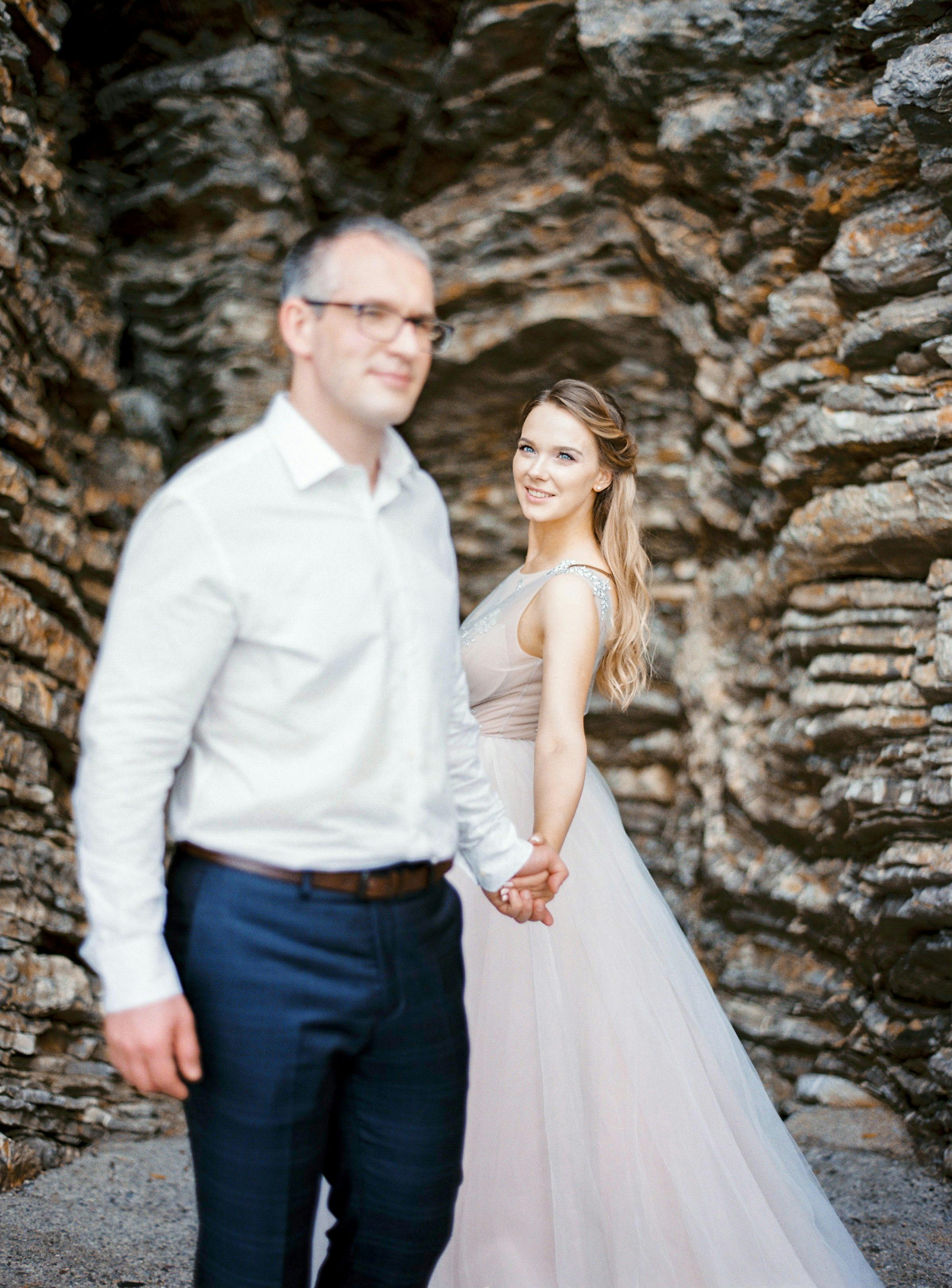 Wedding Couple and Grass Decoration in Background · Free Stock Photo