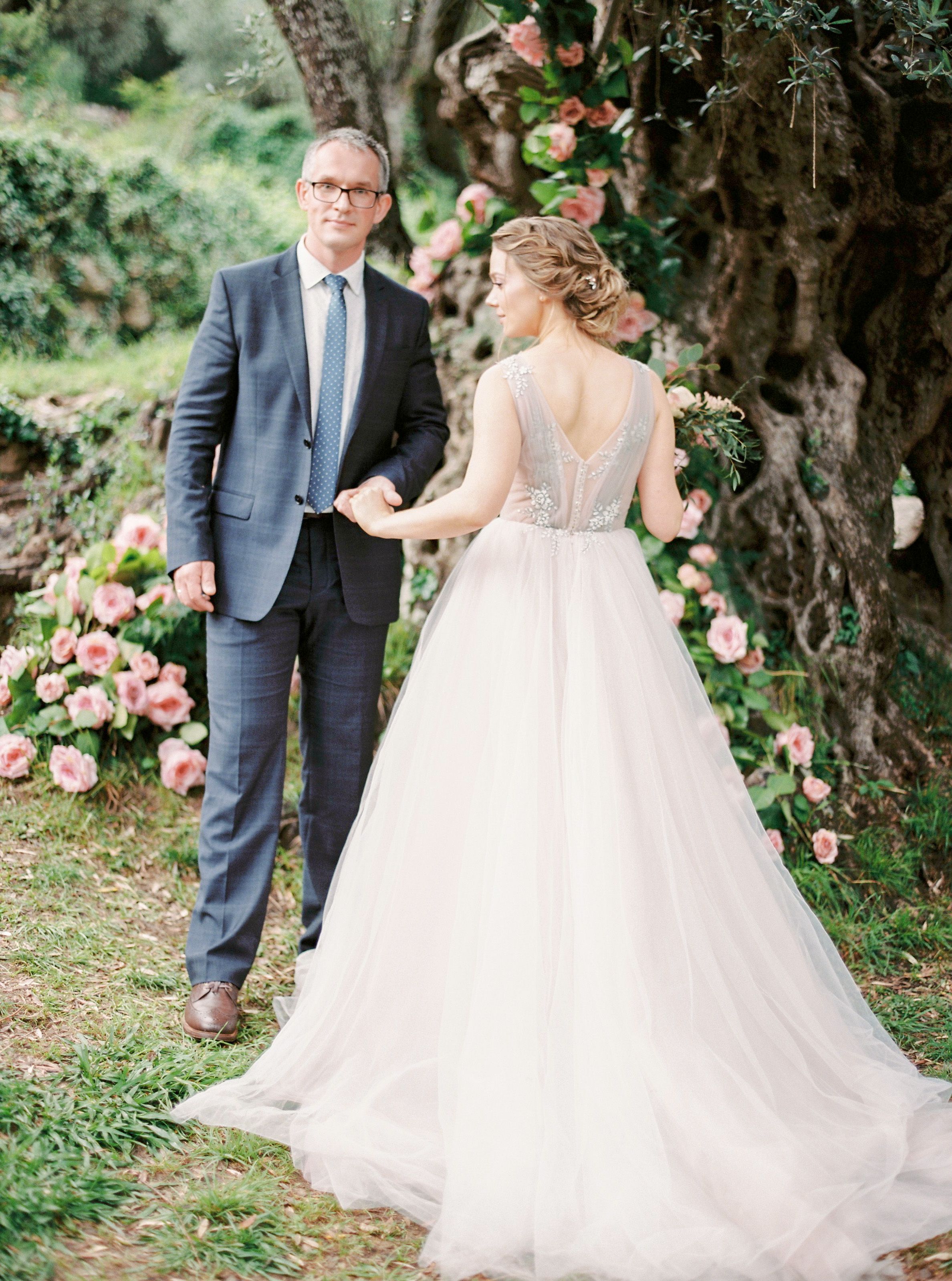 Bride and Groom in Traditional Clothing Looking at Each Other and ...