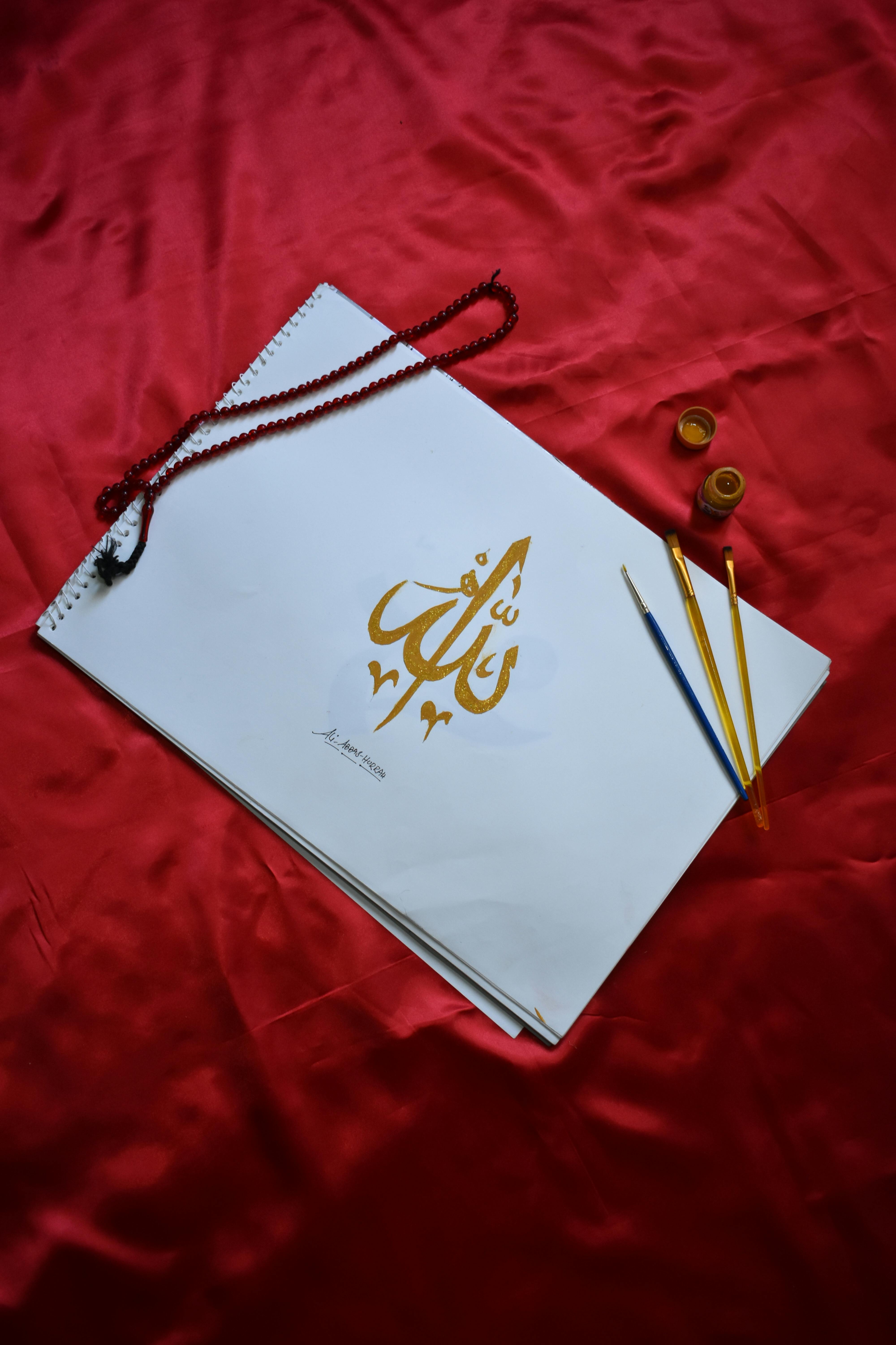 Close-up of Arabic Script on Paper · Free Stock Photo