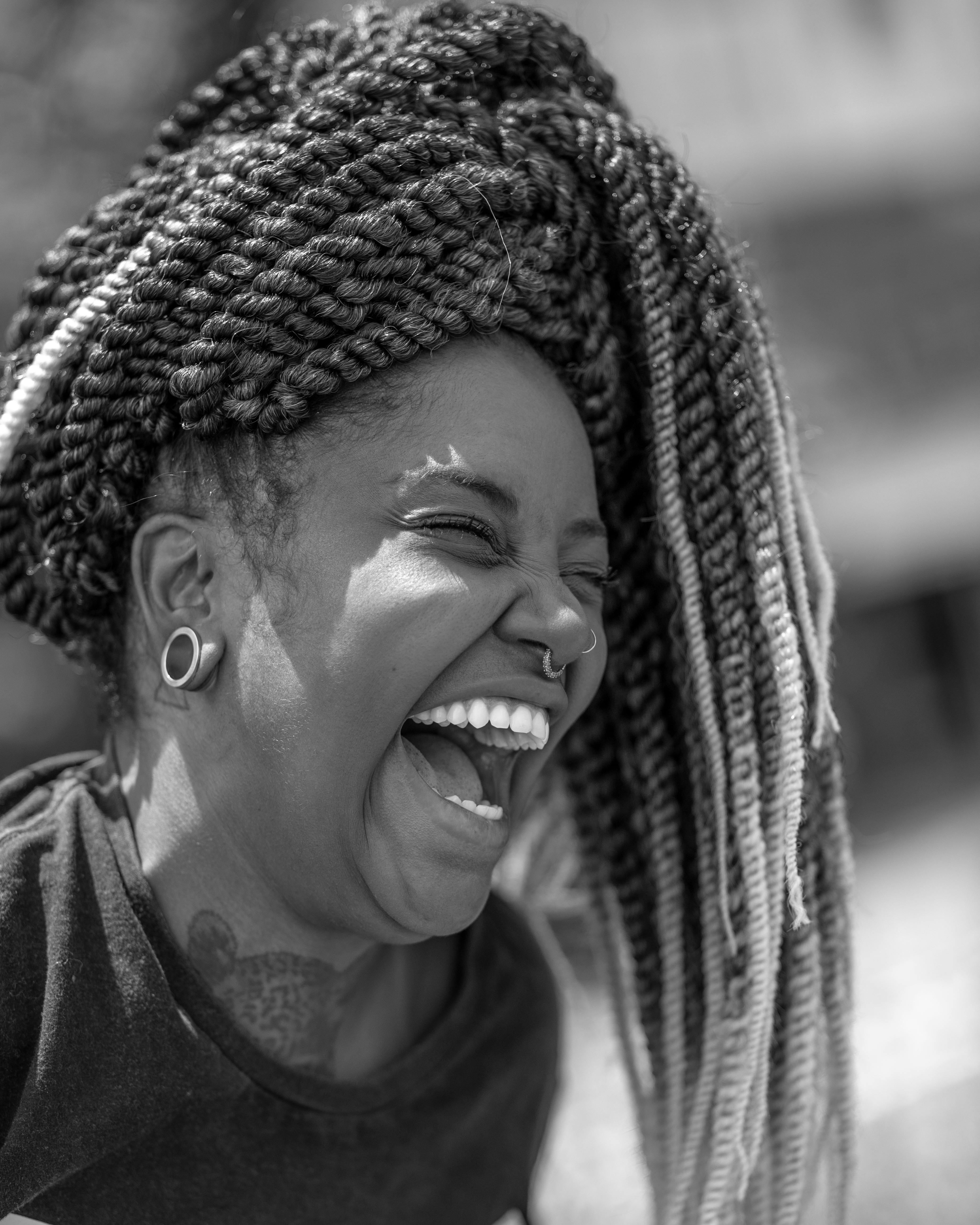 Laughing Woman with Tied Dreadlocks · Free Stock Photo