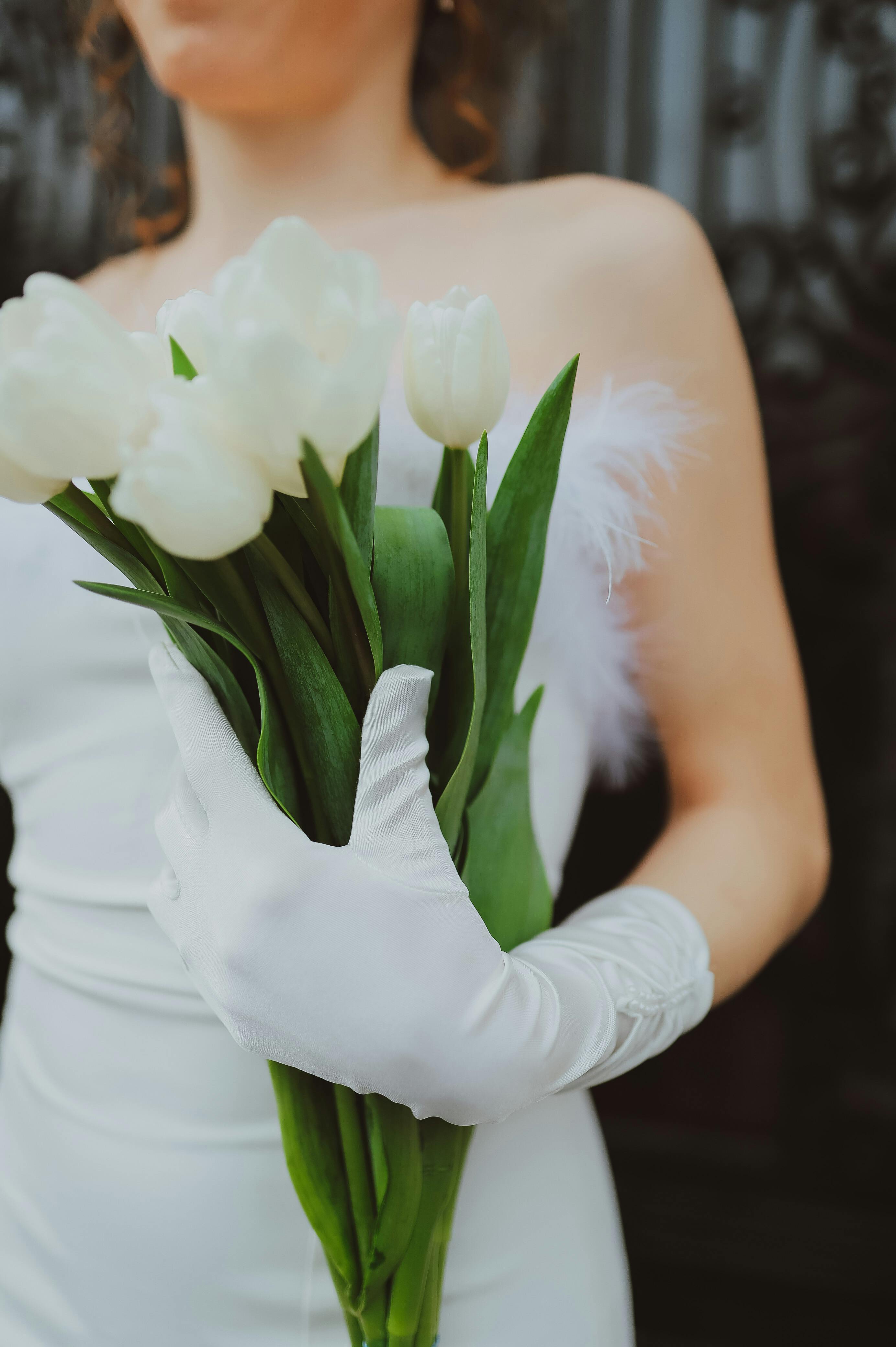 A Bride Holding White Tulips · Free Stock Photo