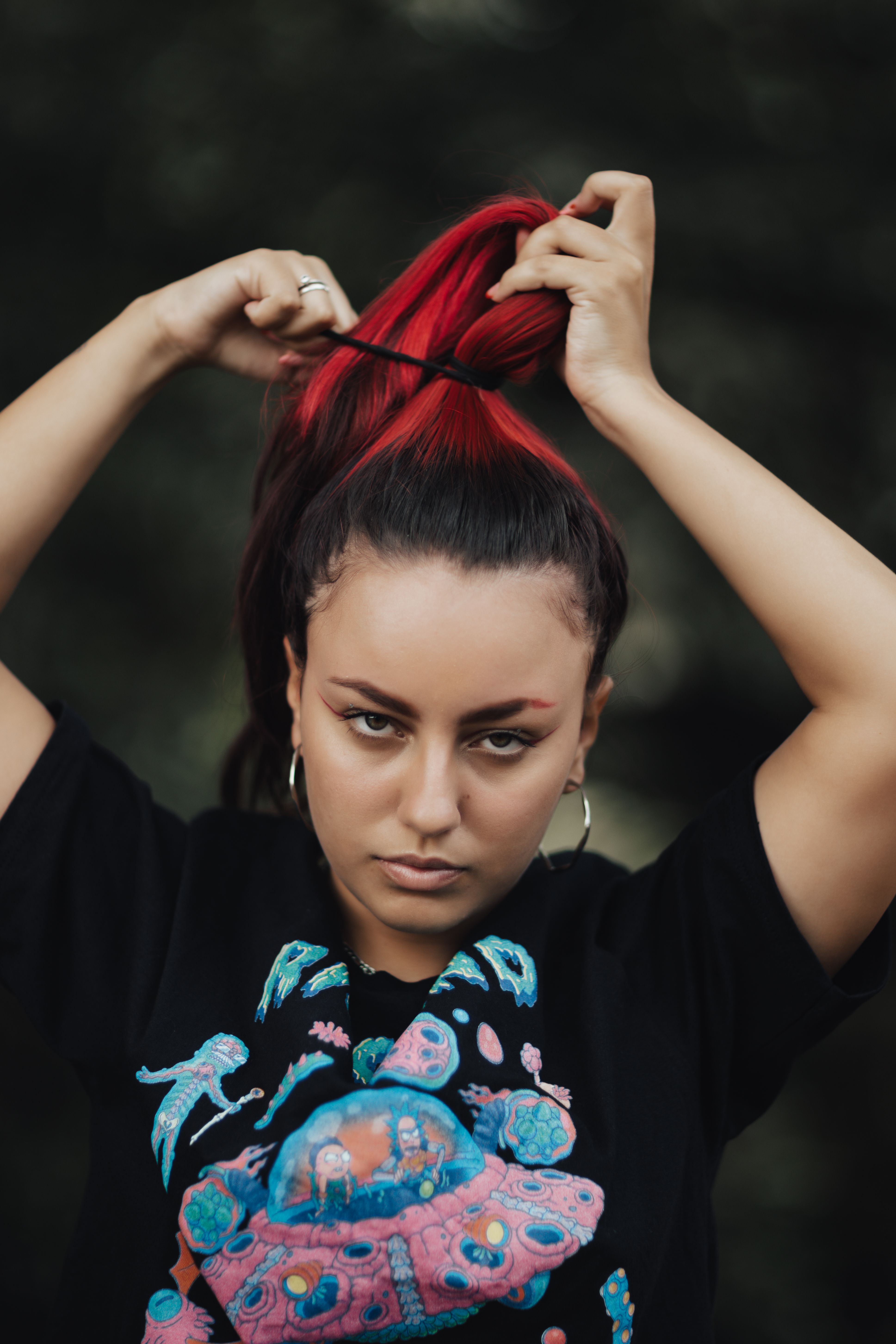 Girl Tying her Hair in a Ponytail · Free Stock Photo