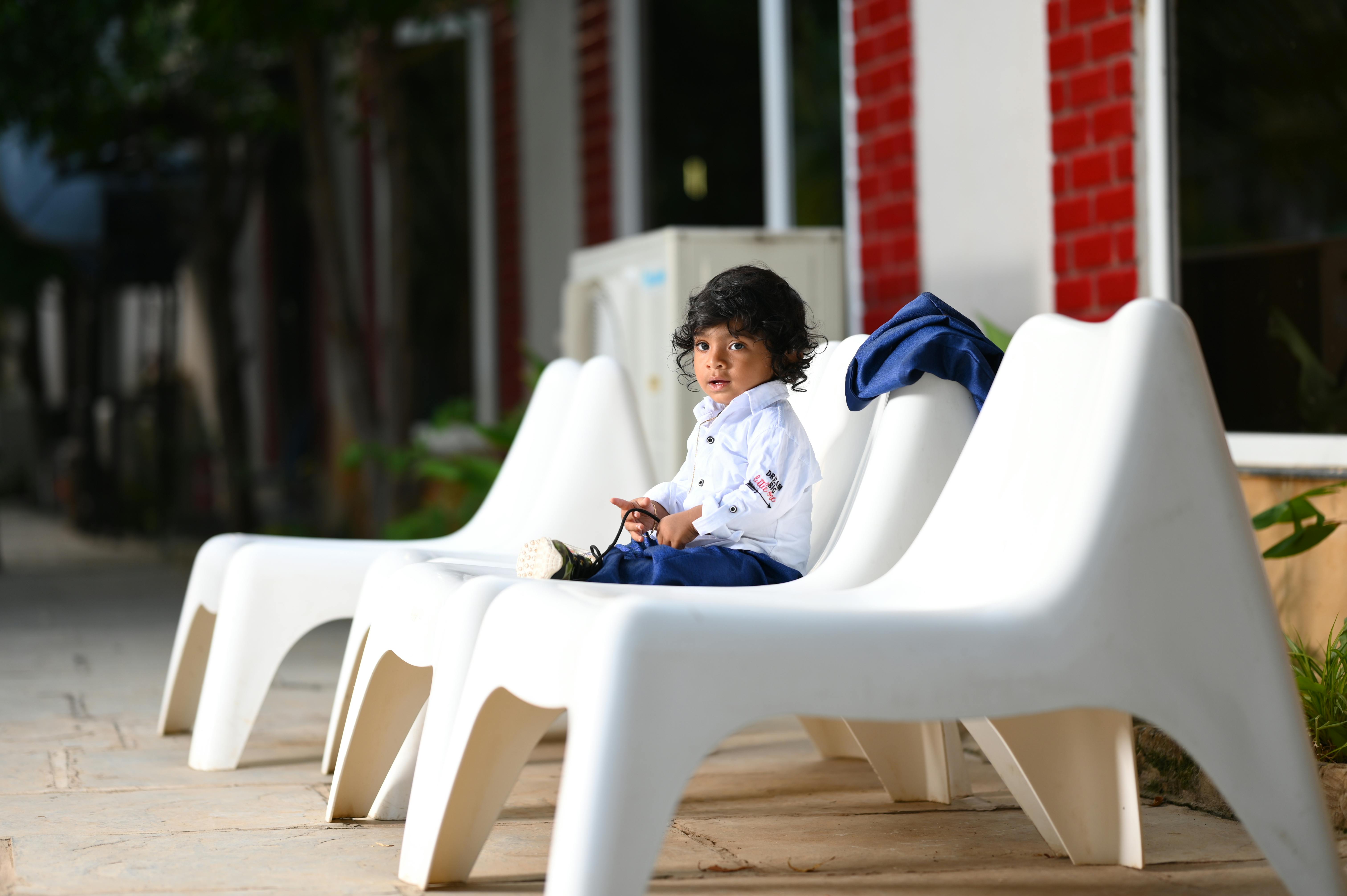 Boy in Red Shirt Sitting on Gaming Chair in Front of the Computer ...