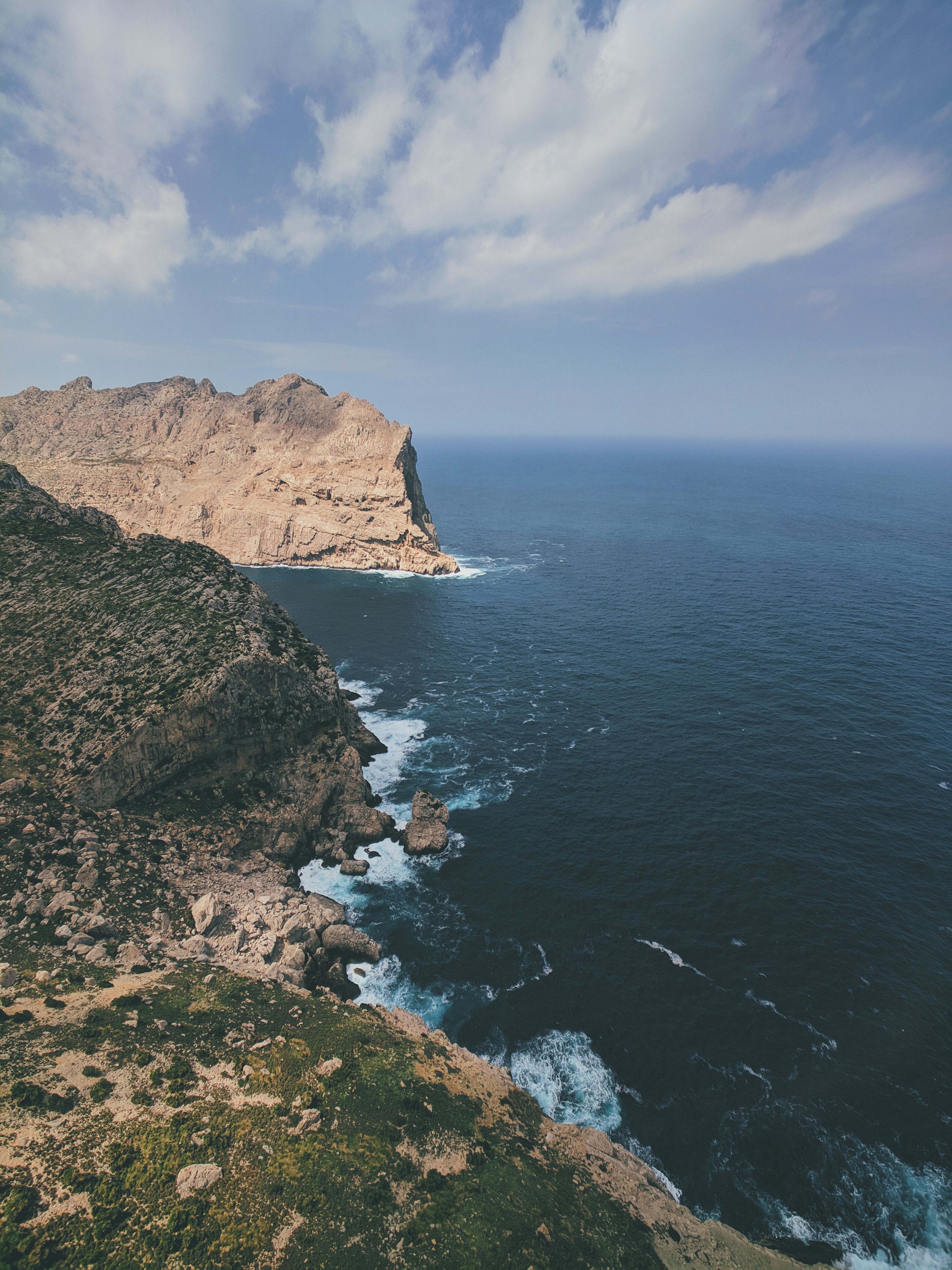 Rocky Cliffs by the Sea · Free Stock Photo