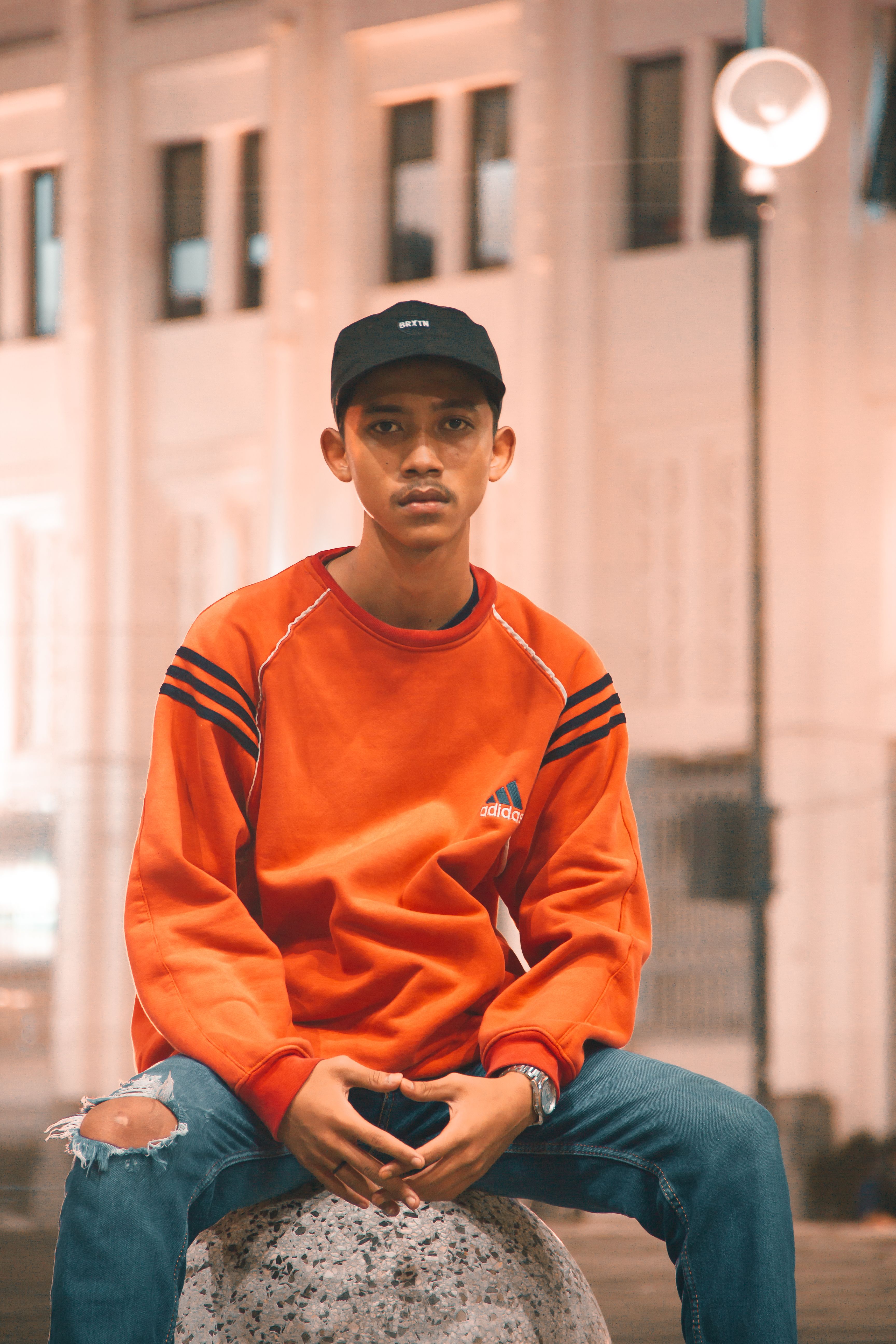 Man in Sweatshirt on Street · Free Stock Photo
