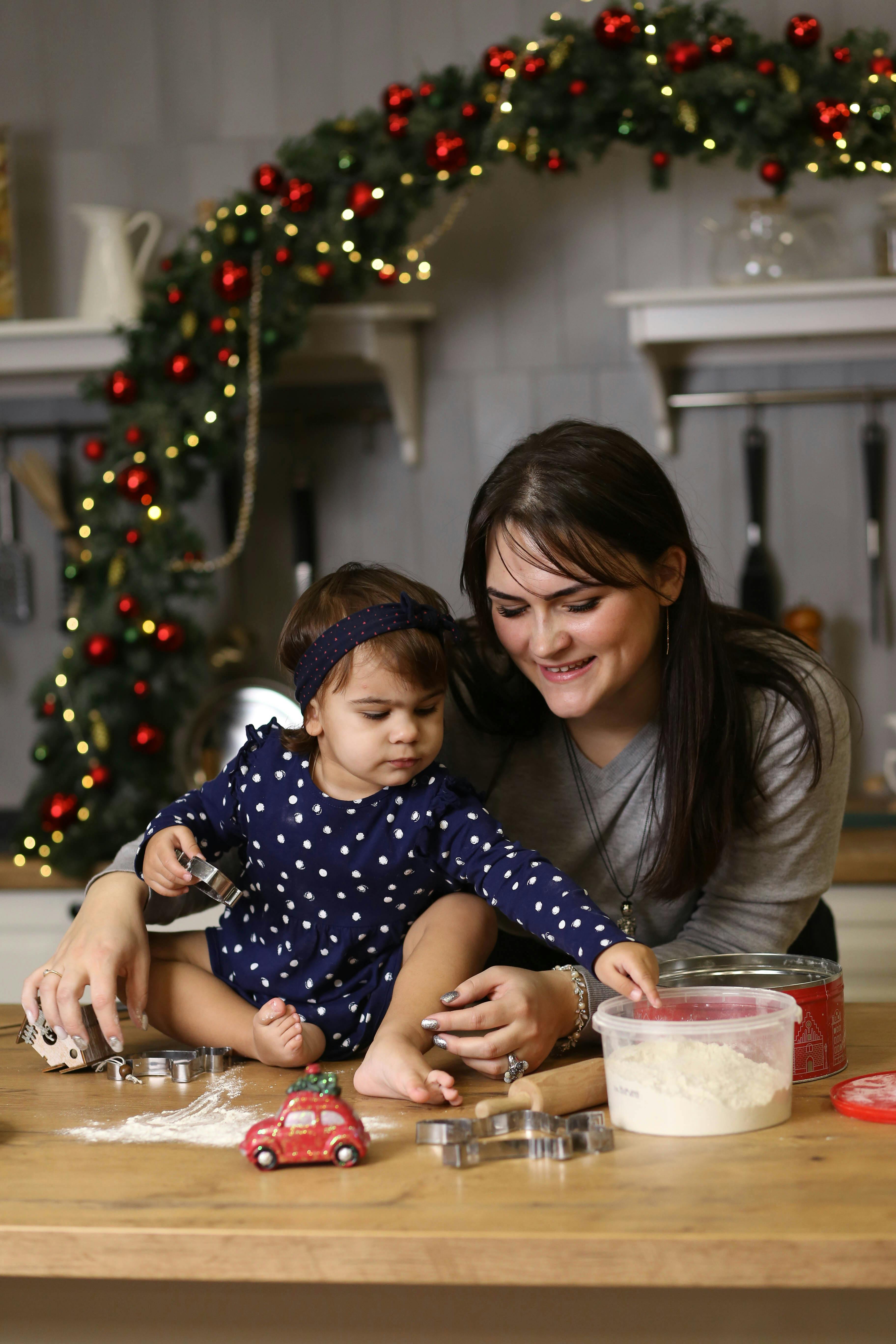 Woman Making Cookies with her Daughter · Free Stock Photo