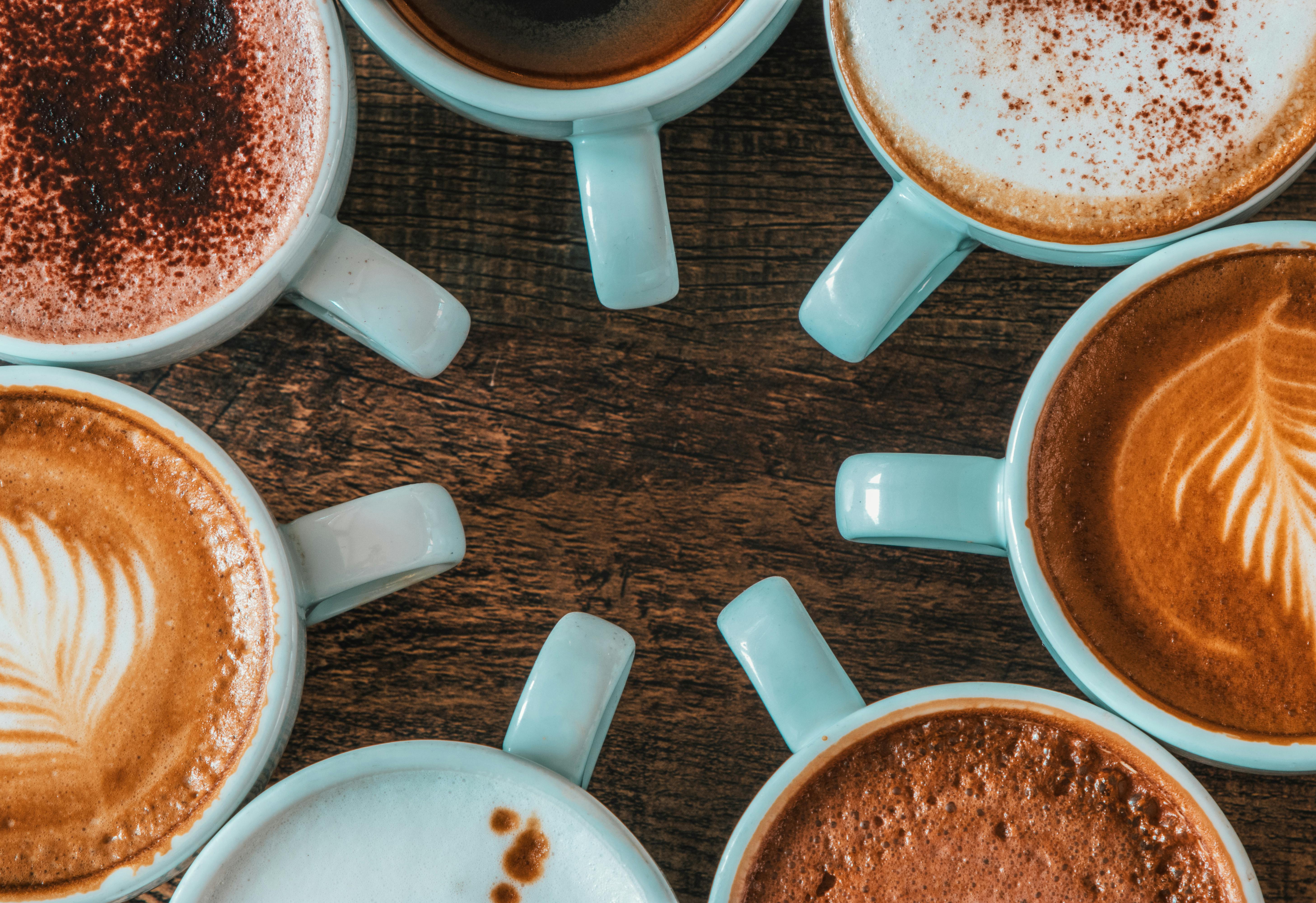 Coffee Cups Composition on Table · Free Stock Photo