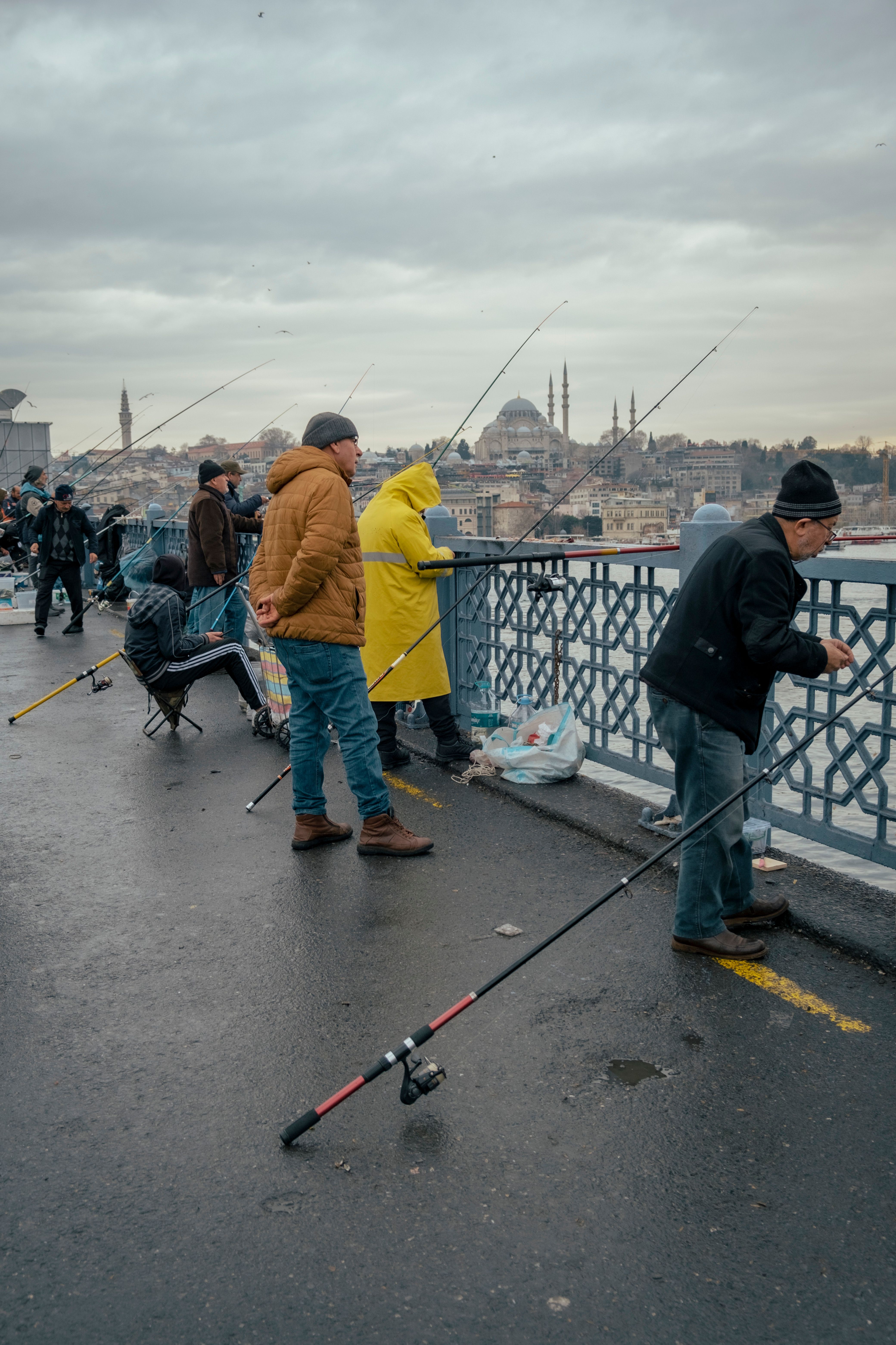 People Fishing on Bridge in City · Free Stock Photo