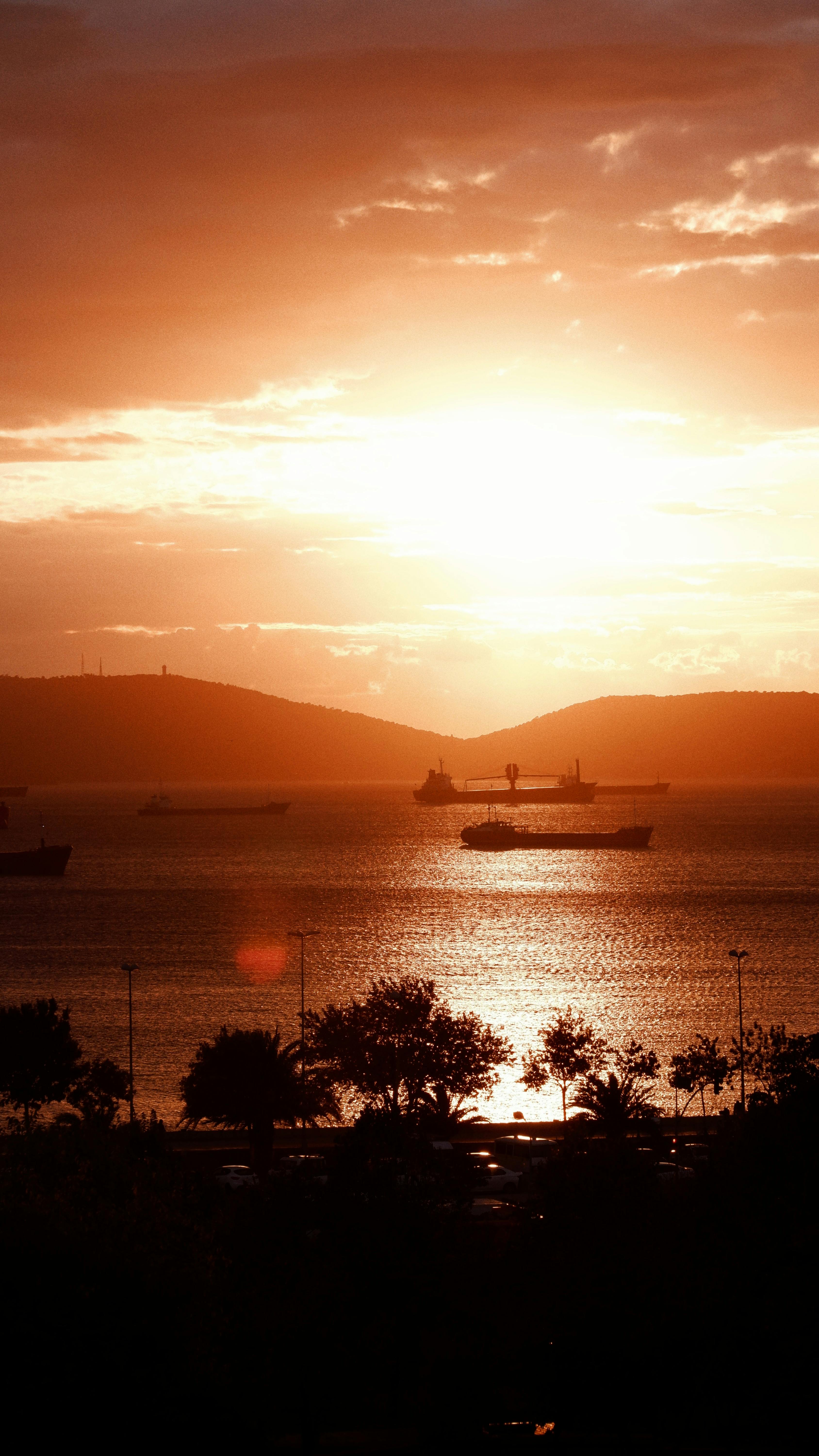 Dramatic Sky at Sunset over Bay · Free Stock Photo