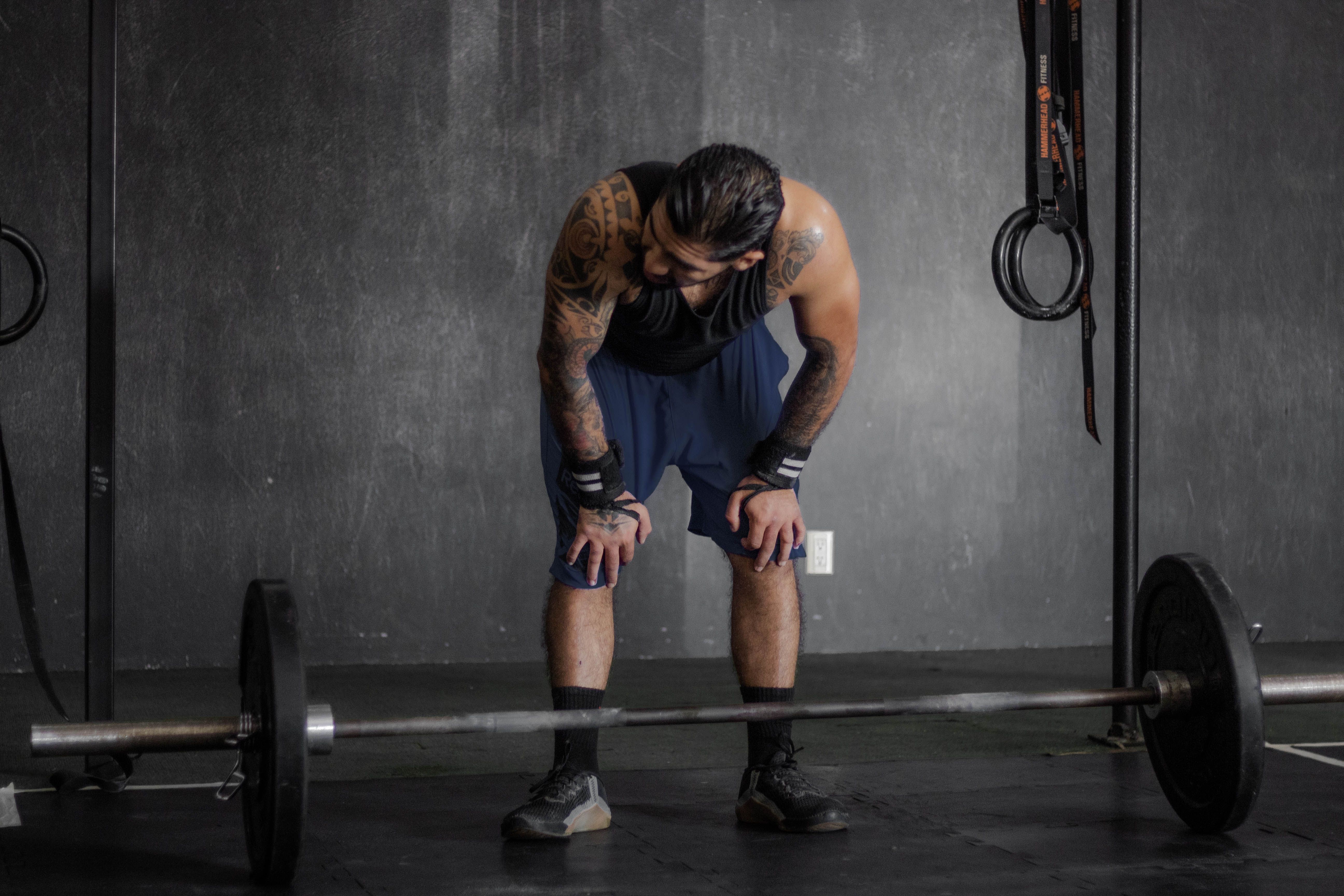 Man with Tattoos at Gym · Free Stock Photo