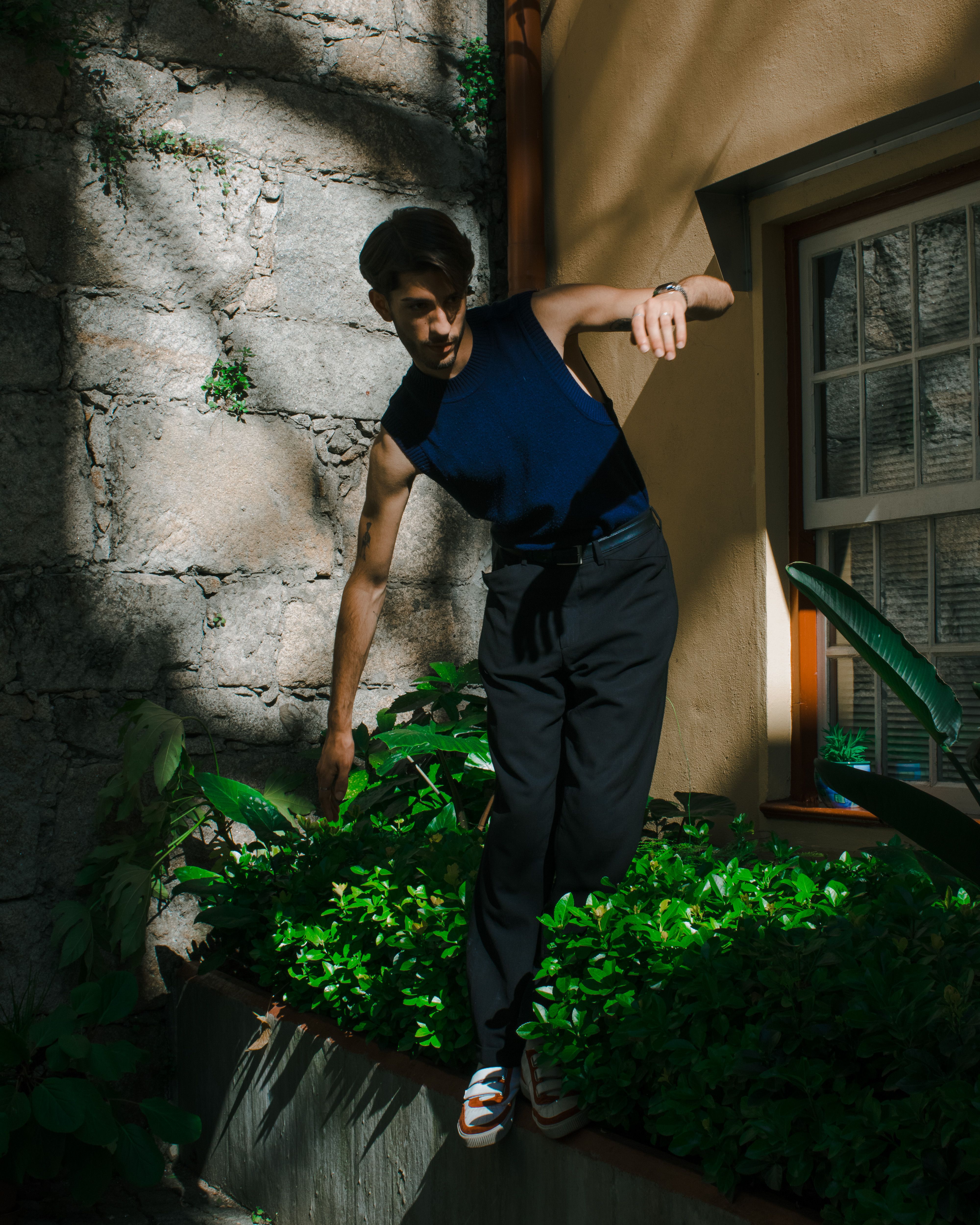 Model Posing in Black Pants · Free Stock Photo