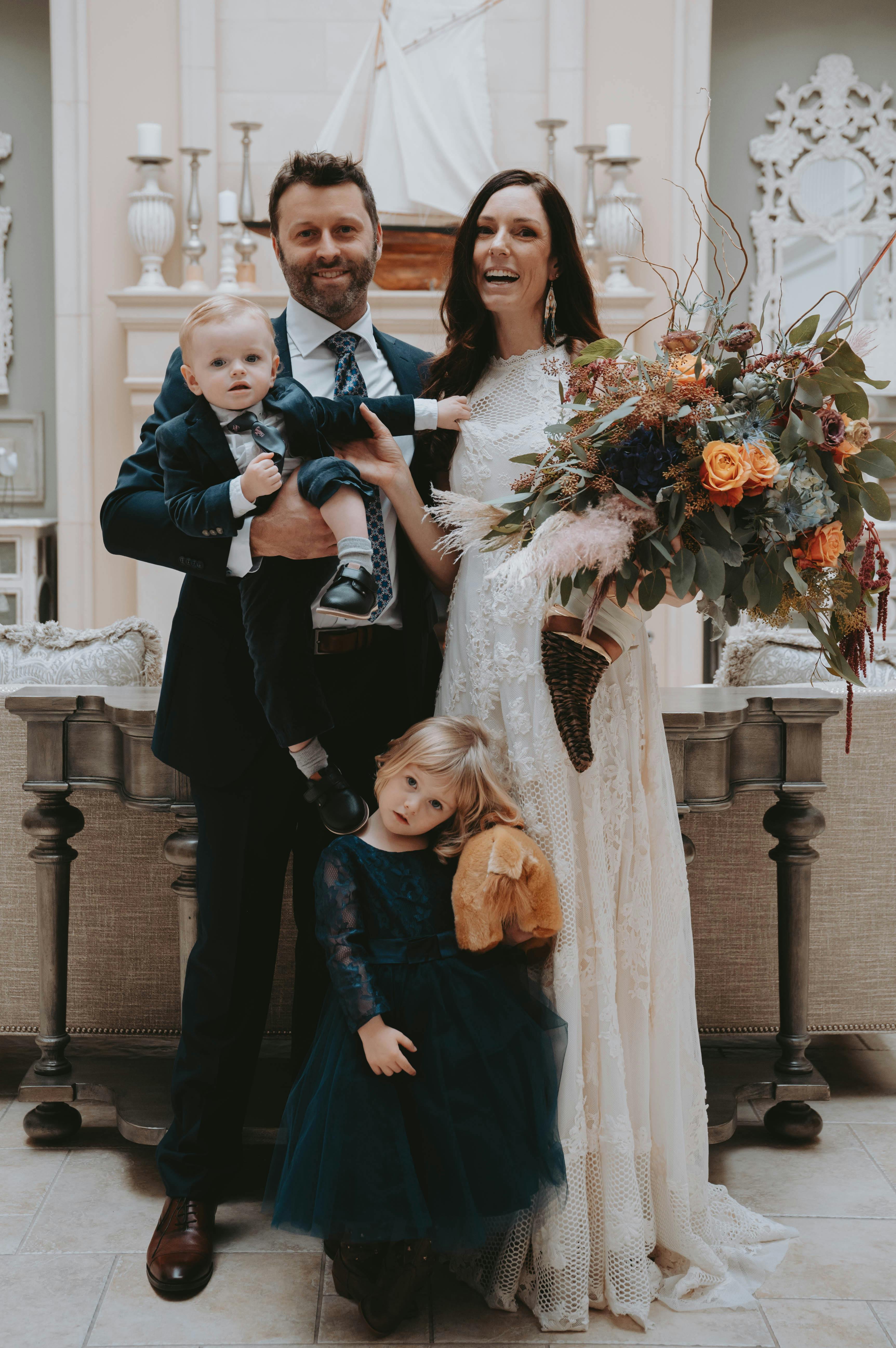Family in Formal Wear Posing Together · Free Stock Photo