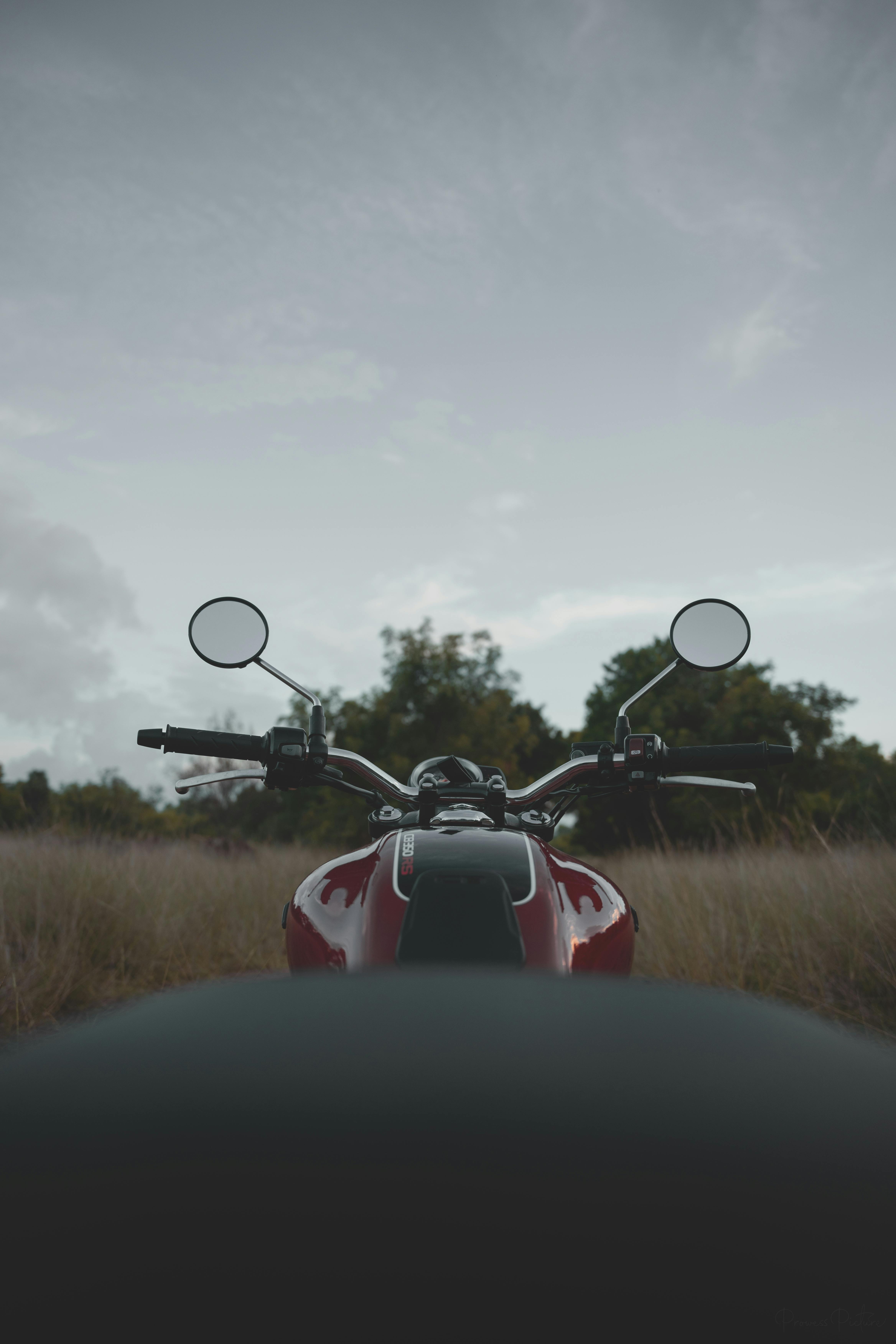 Motorcycle on a Grass Field · Free Stock Photo