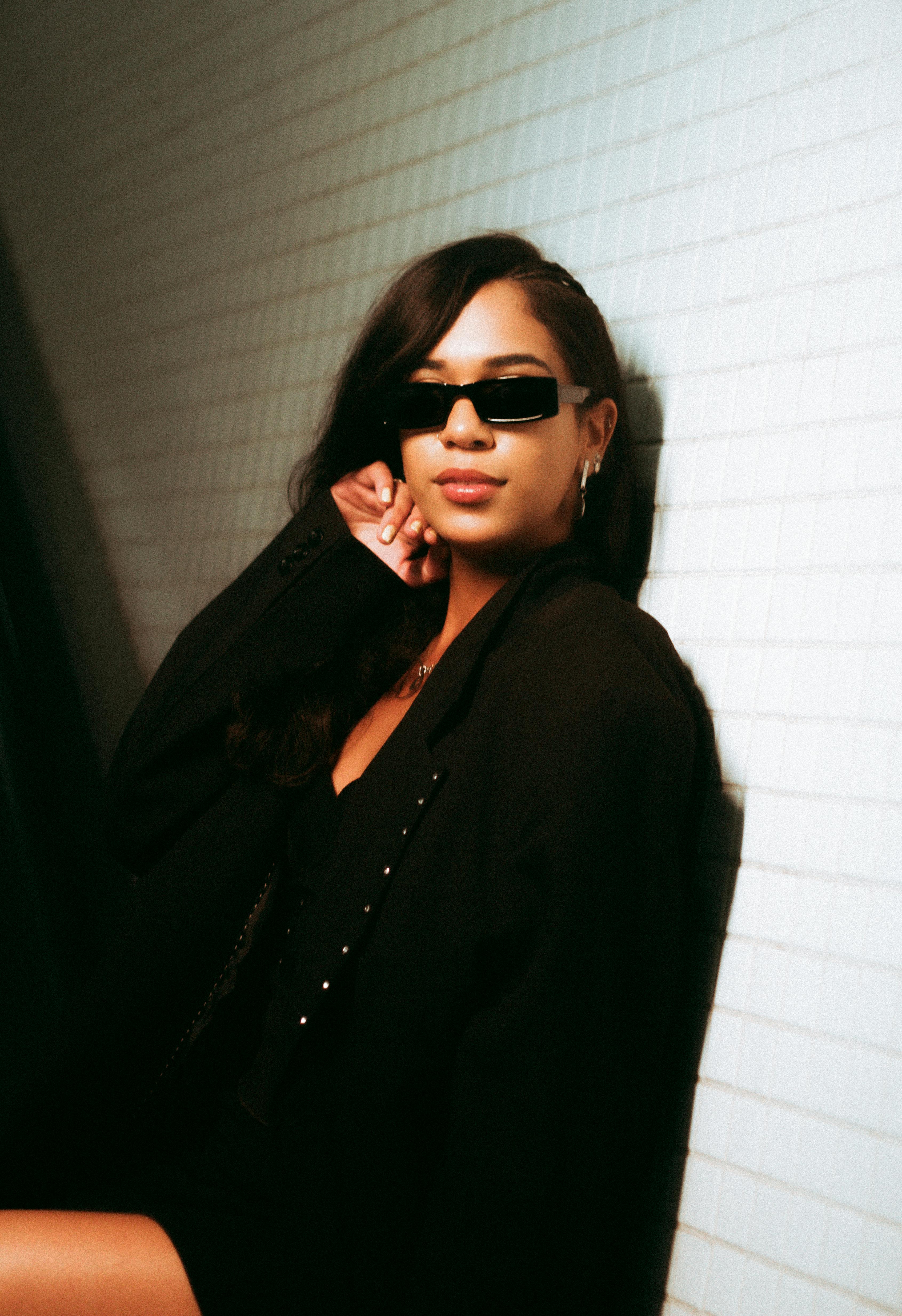 Woman Posing in Black Jacket and Sunglasses · Free Stock Photo