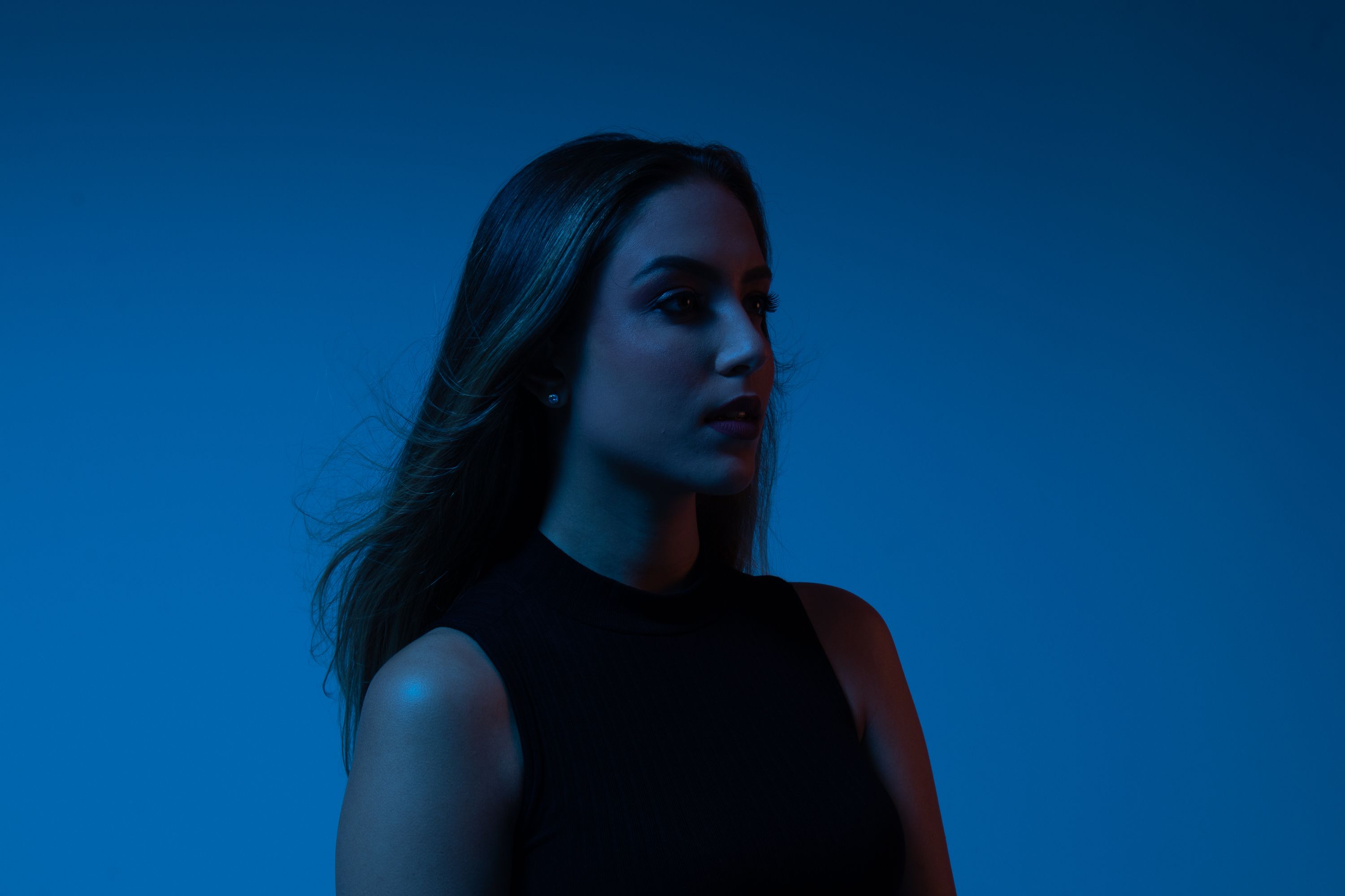 Dimly Lit Portrait of a Woman · Free Stock Photo