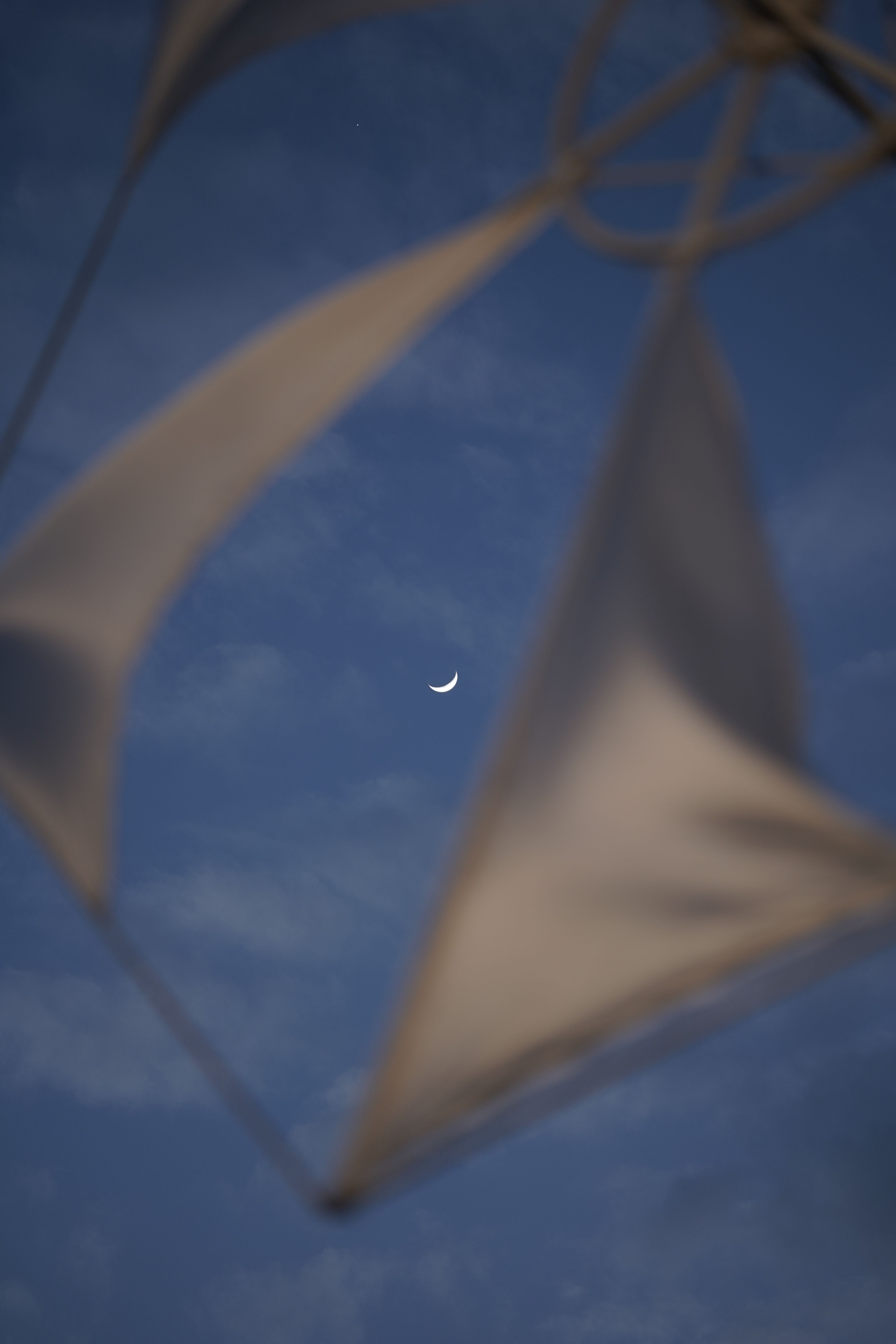 Grayscale Photo of a Crescent Moon · Free Stock Photo