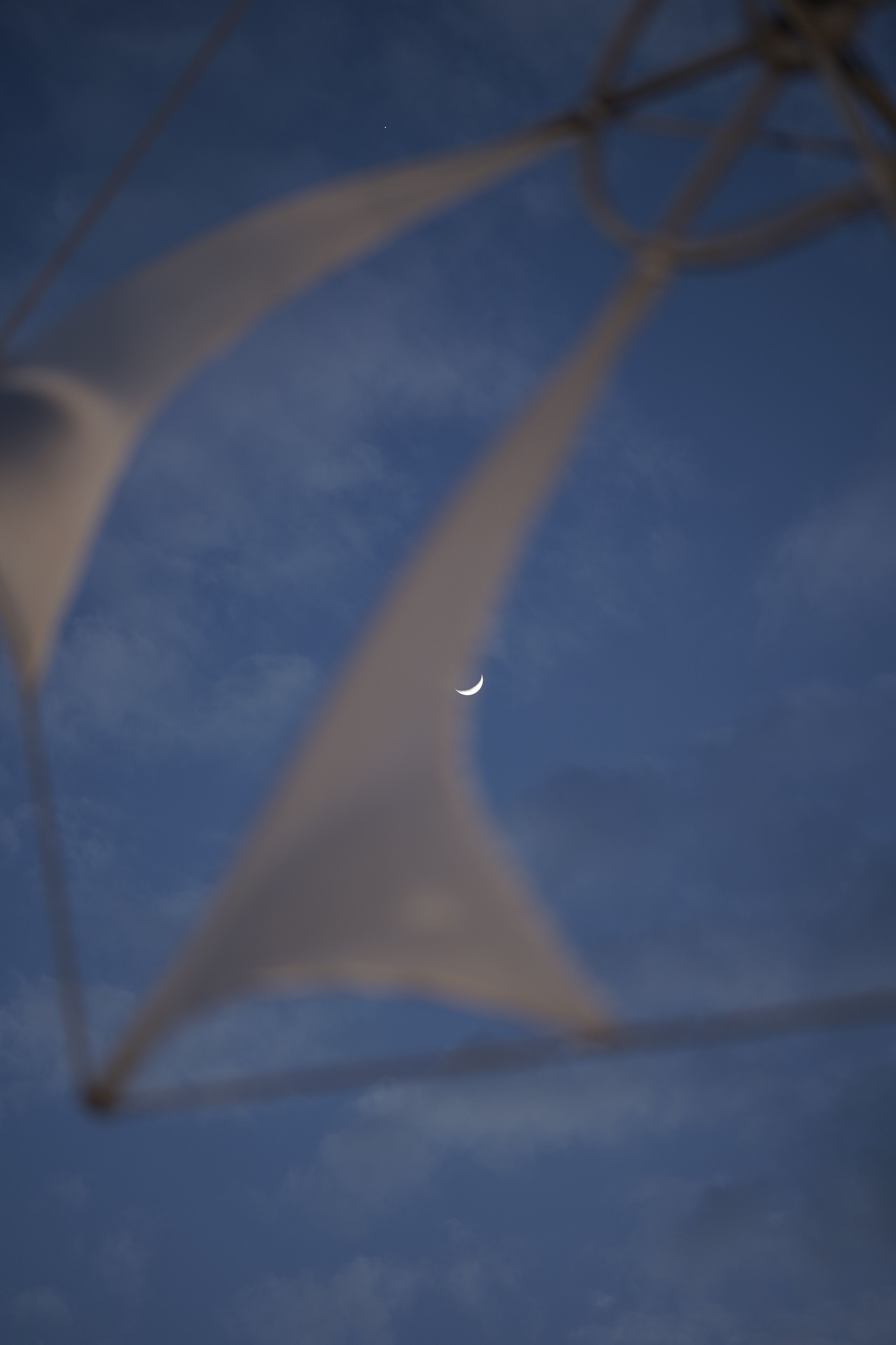 Grayscale Photo of a Crescent Moon · Free Stock Photo