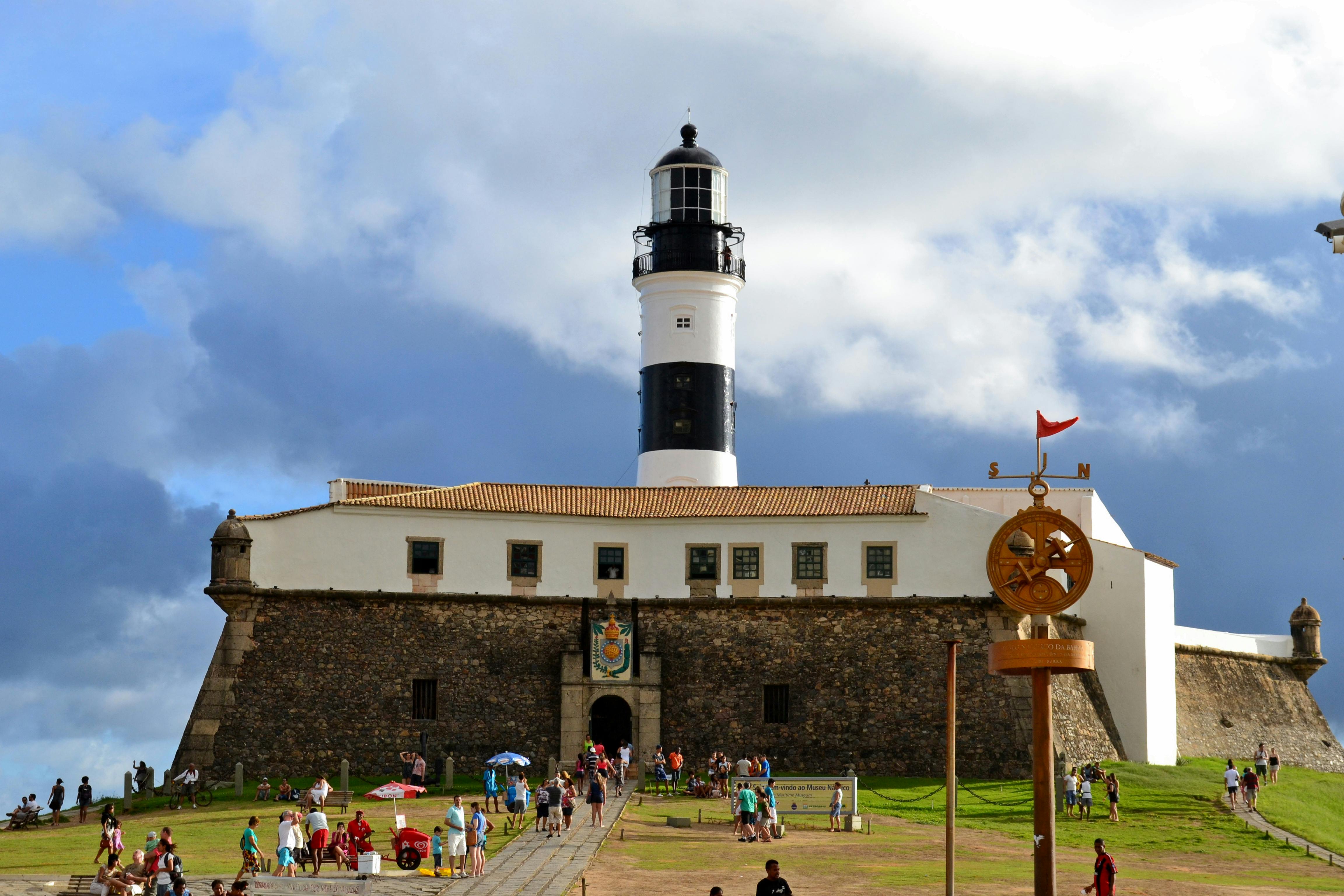 Tourists Visiting a Lighthouse · Free Stock Photo