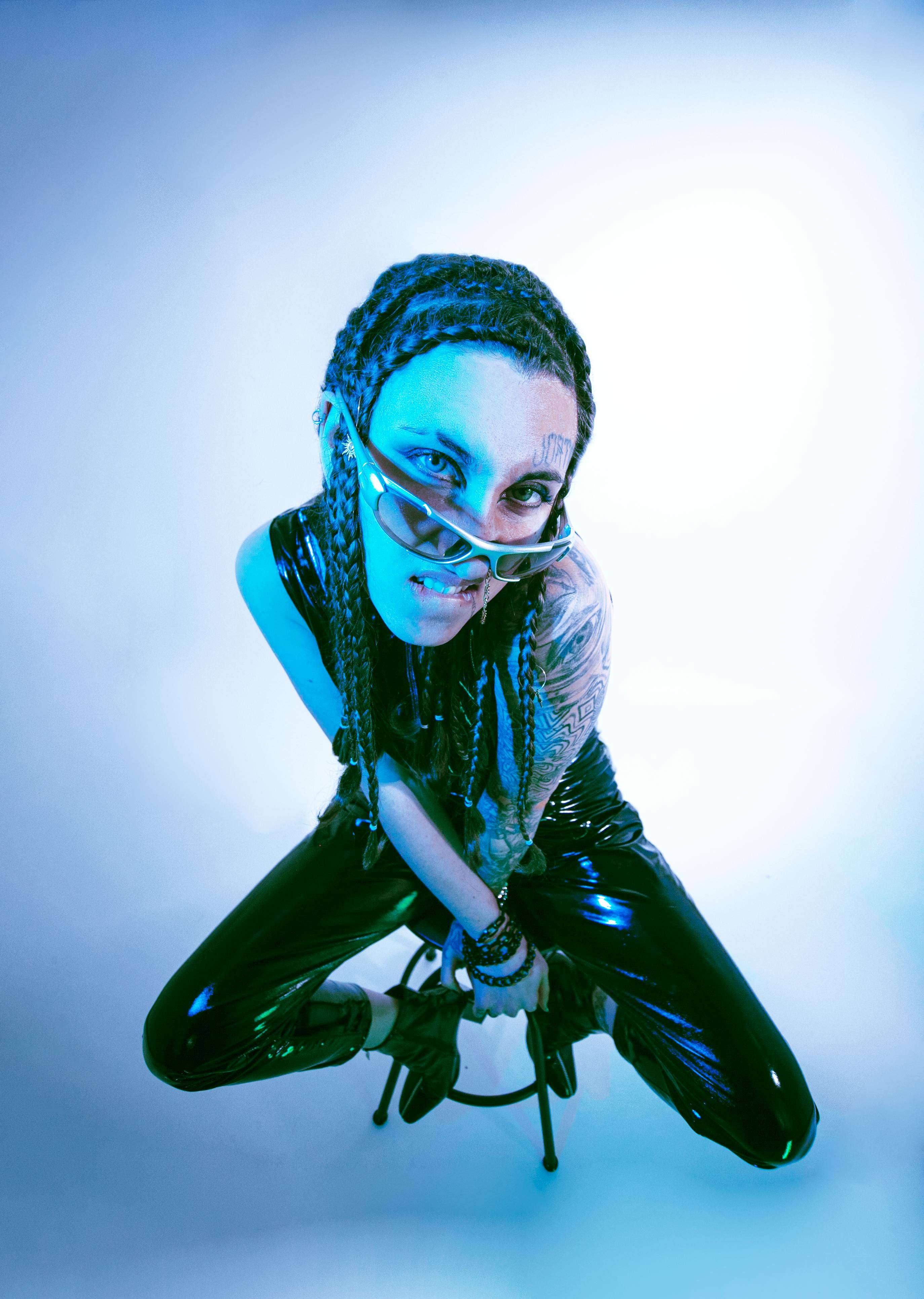 Woman Crouching with Academic Hat · Free Stock Photo