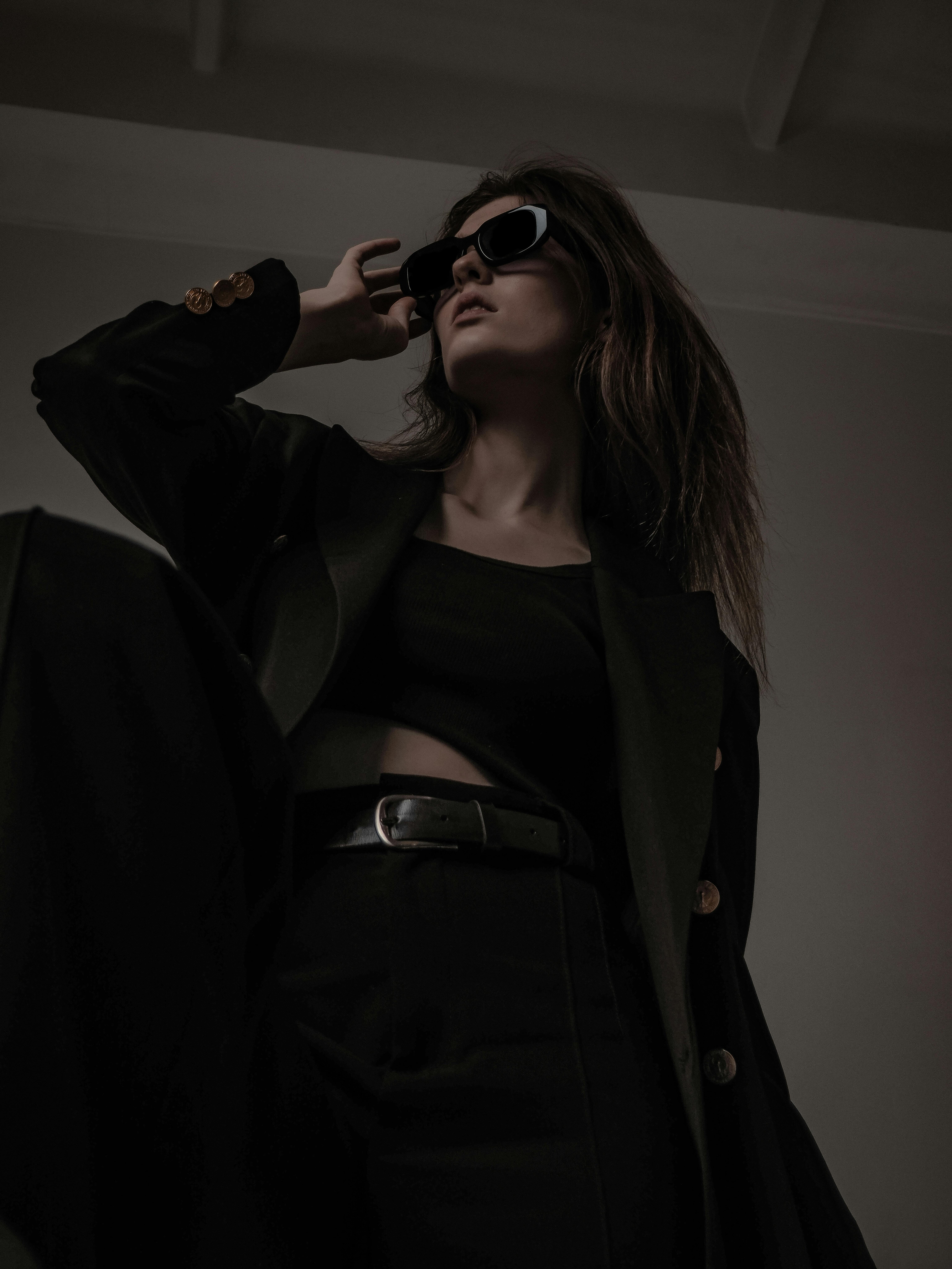 Low-Angle Shot of a Woman Posing · Free Stock Photo