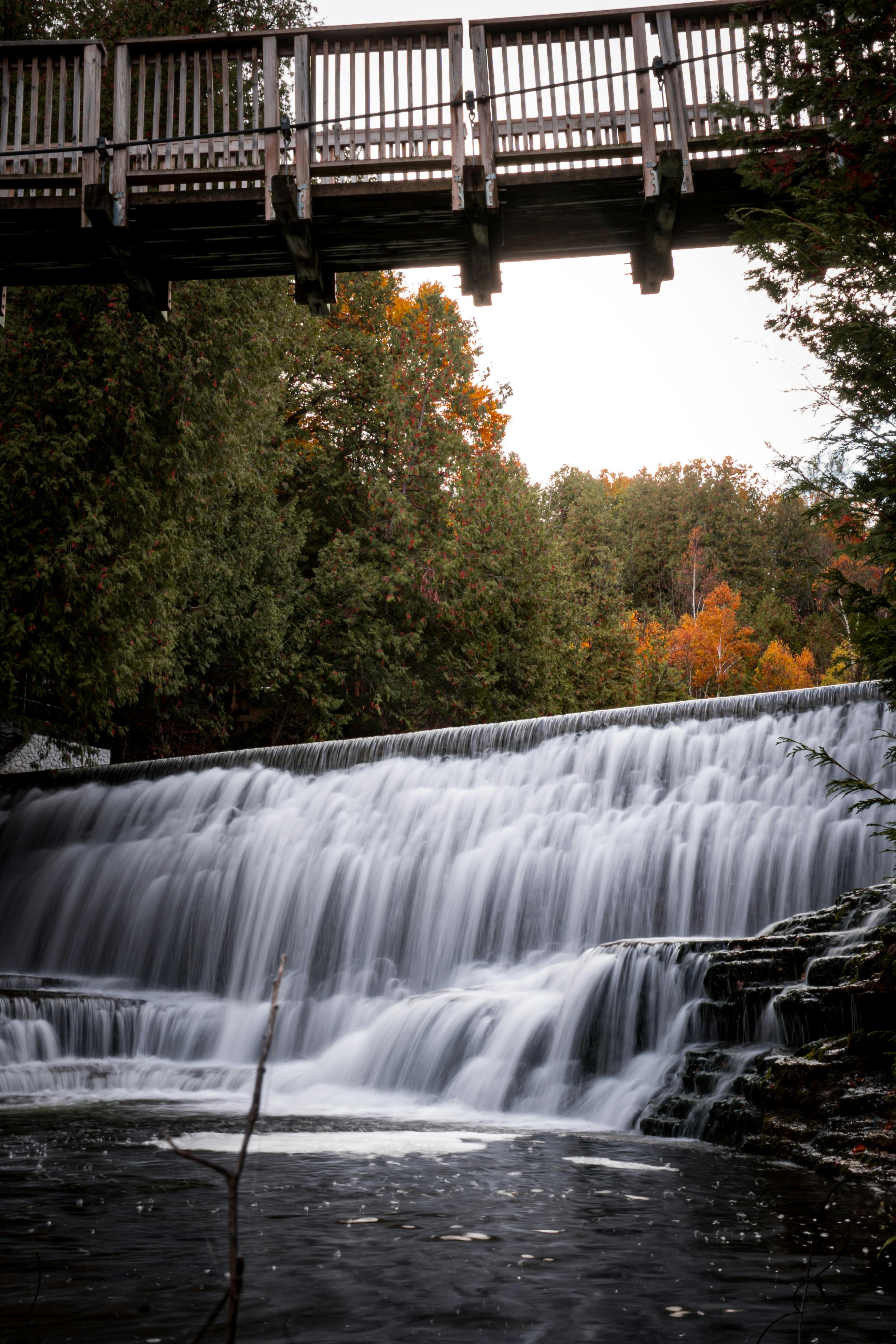 Photo of Waterfalls Under Bridge · Free Stock Photo