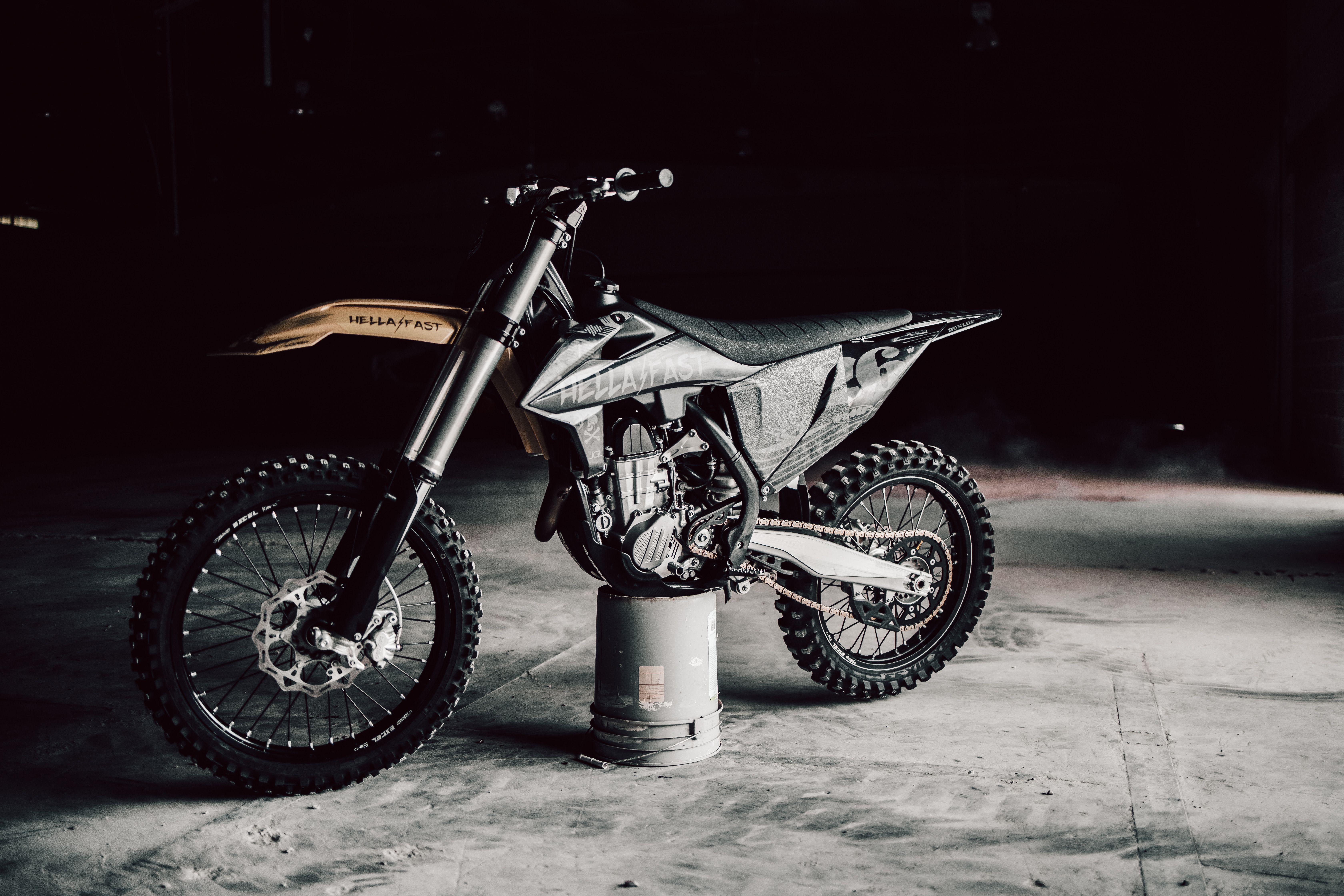 Motorcycle Resting on Bucket · Free Stock Photo