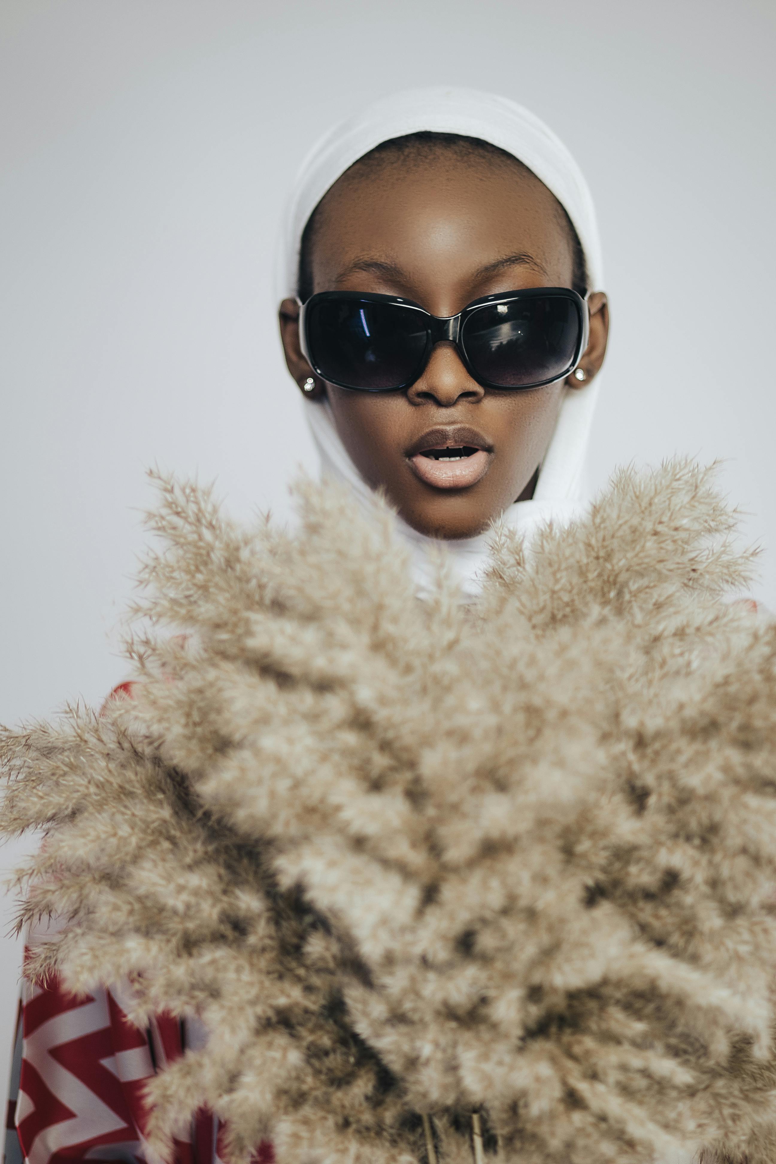Young Doctor Wearing a Hijab and a Stethoscope, Standing against a Wall ...