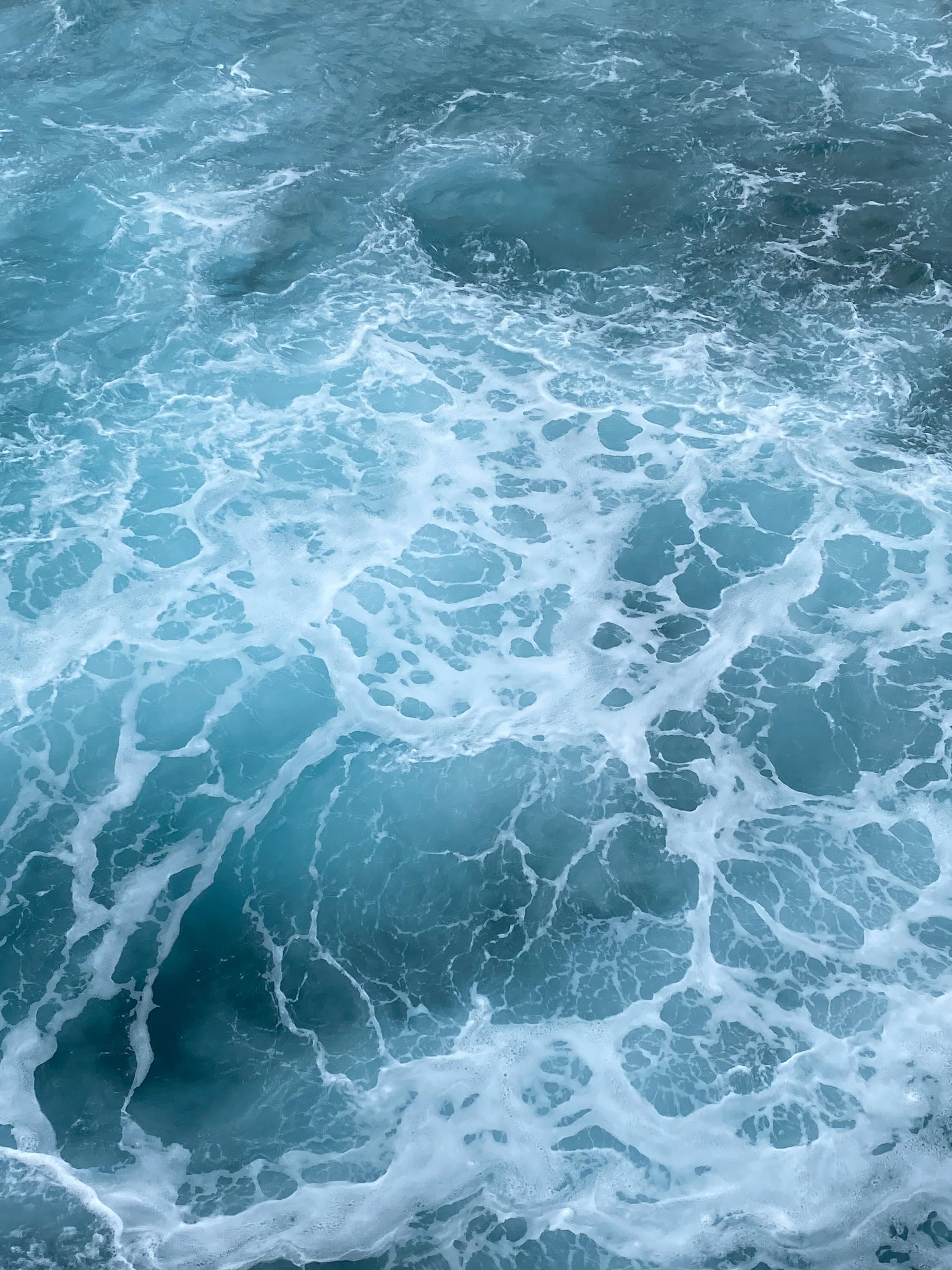 Sea Water Forming Seafoams · Free Stock Photo