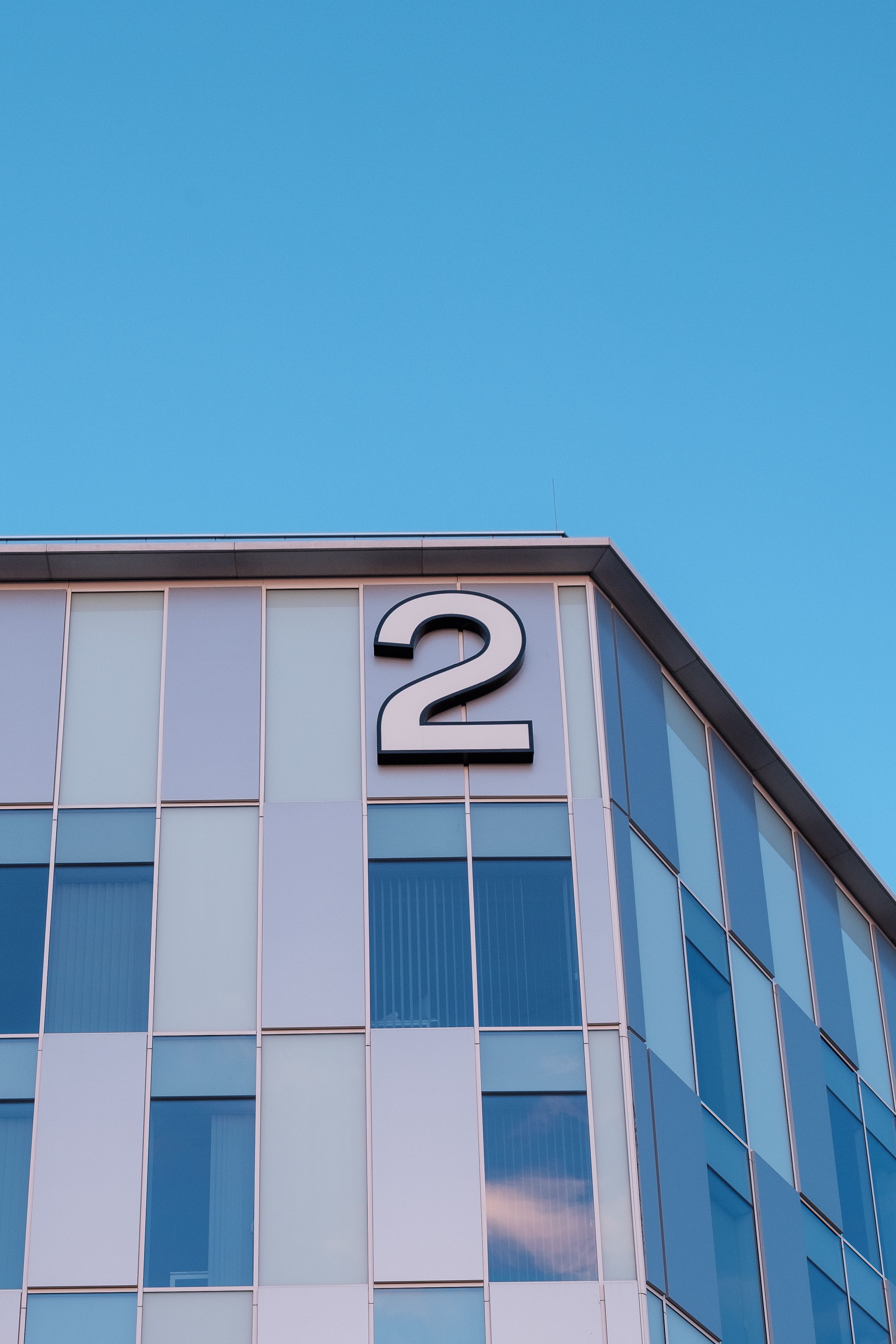 A Glass Building with Number · Free Stock Photo