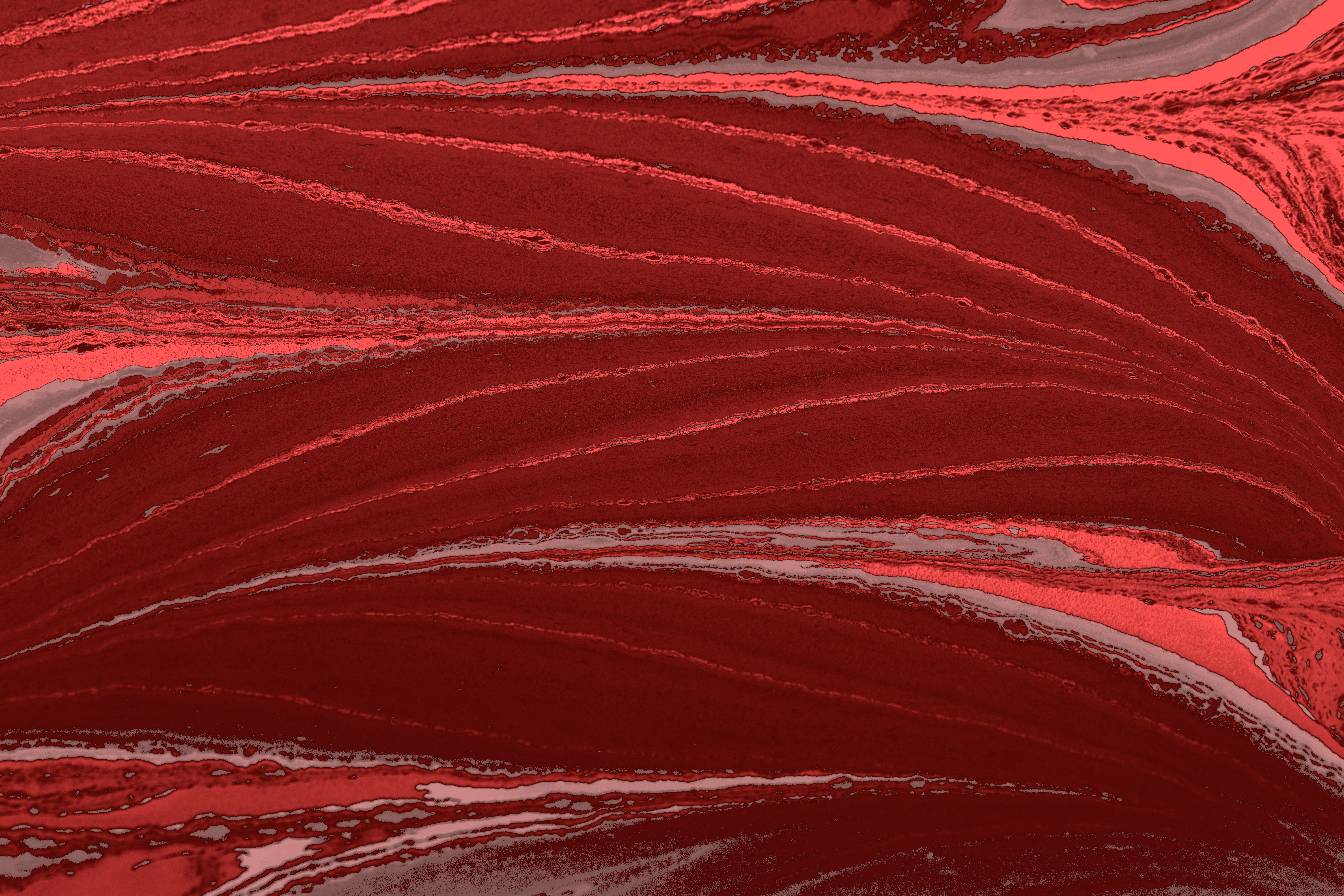 Top View of a Red Creased Shiny Textile · Free Stock Photo