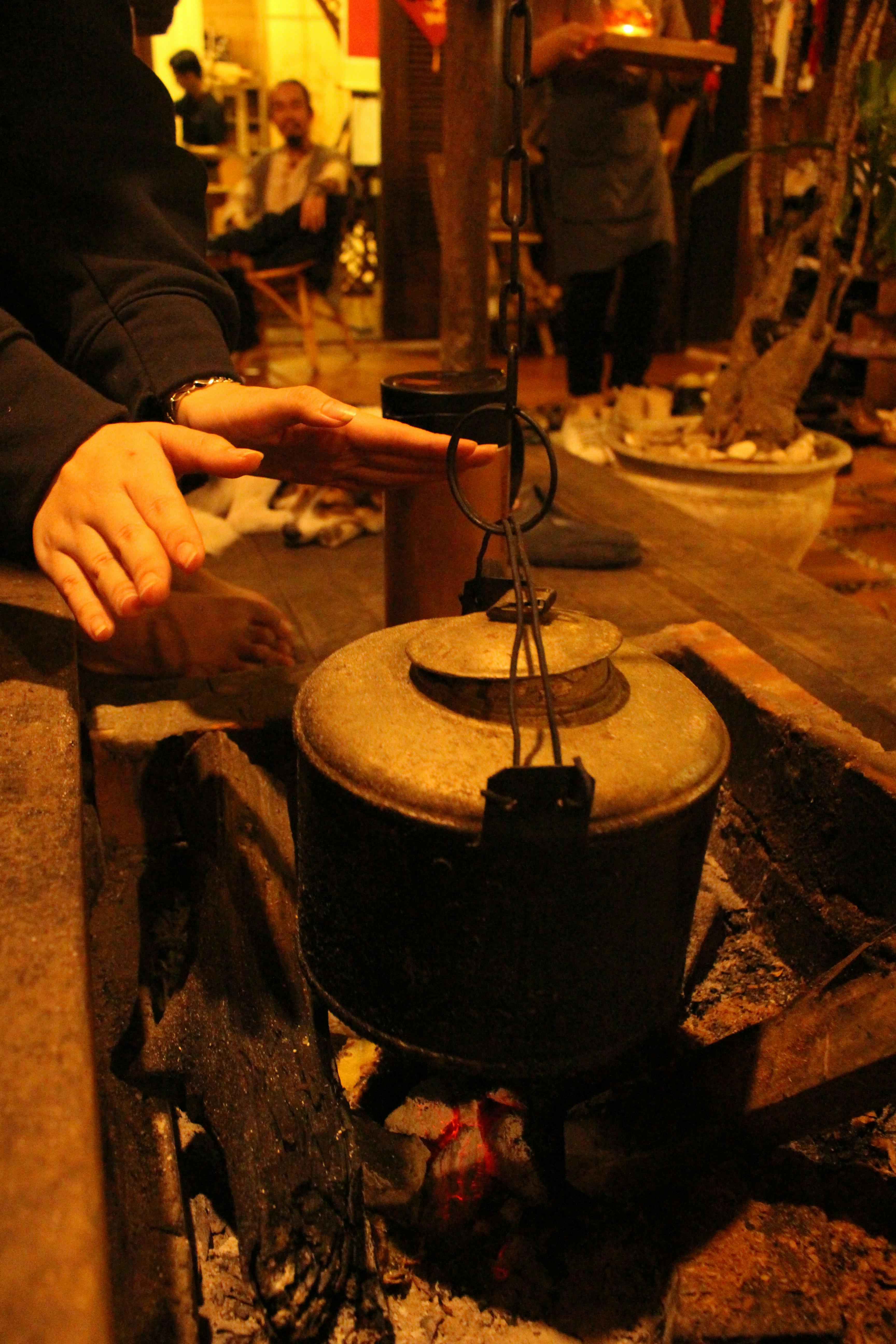Hands over Cooking Pot · Free Stock Photo
