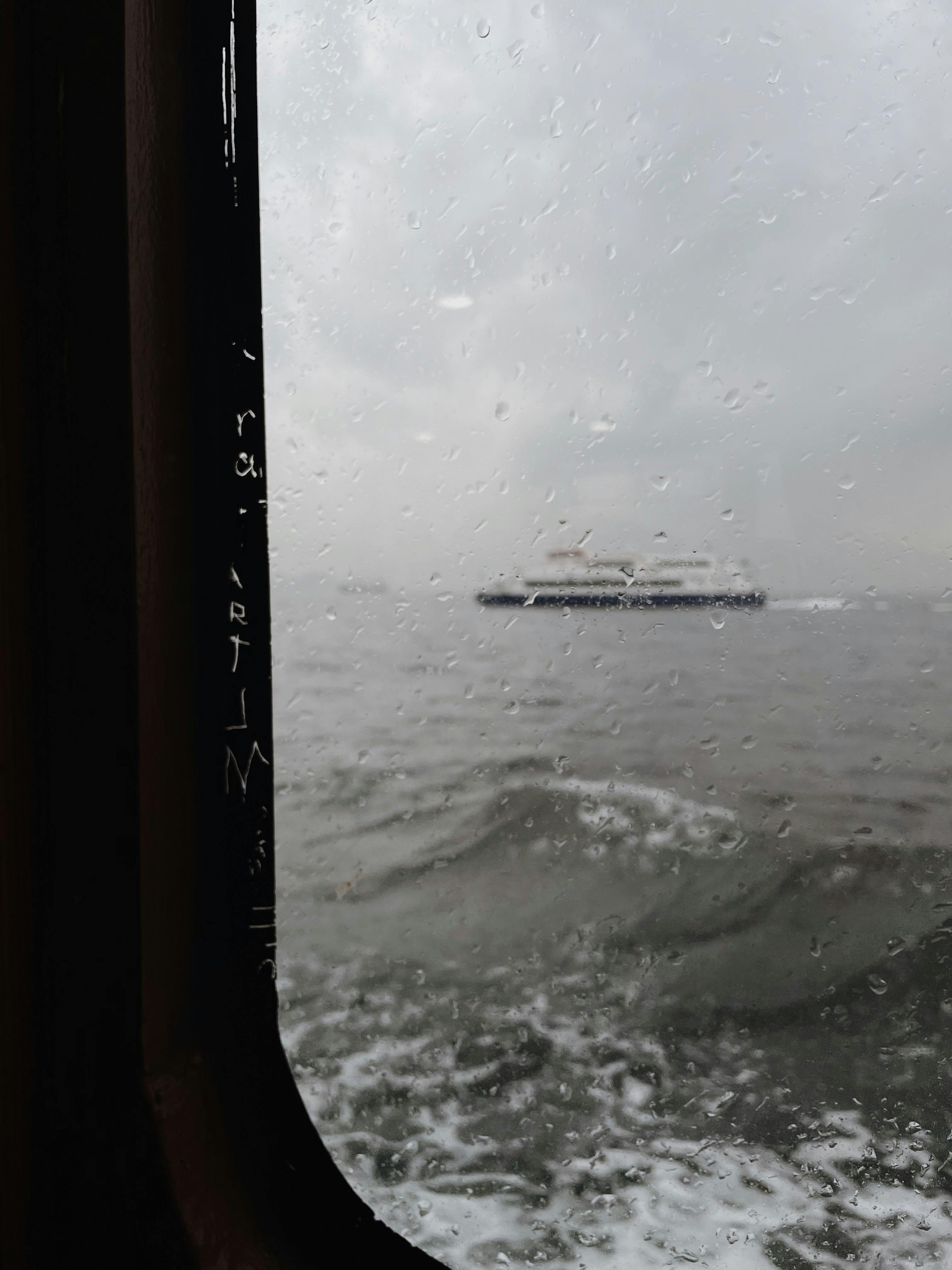Grayscale Photography of a Window on a Ferry Ship · Free Stock Photo