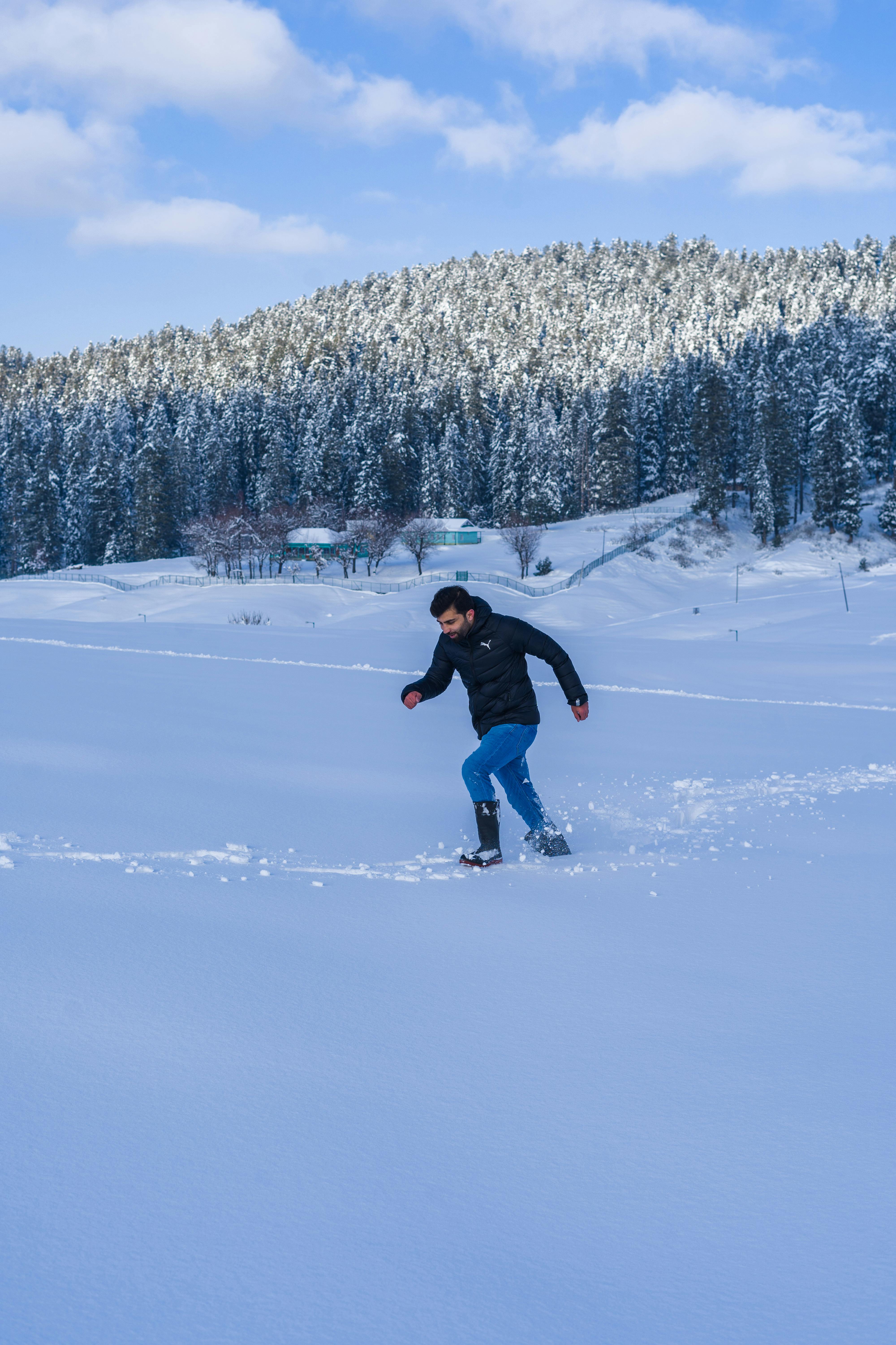Man Running in Snow · Free Stock Photo