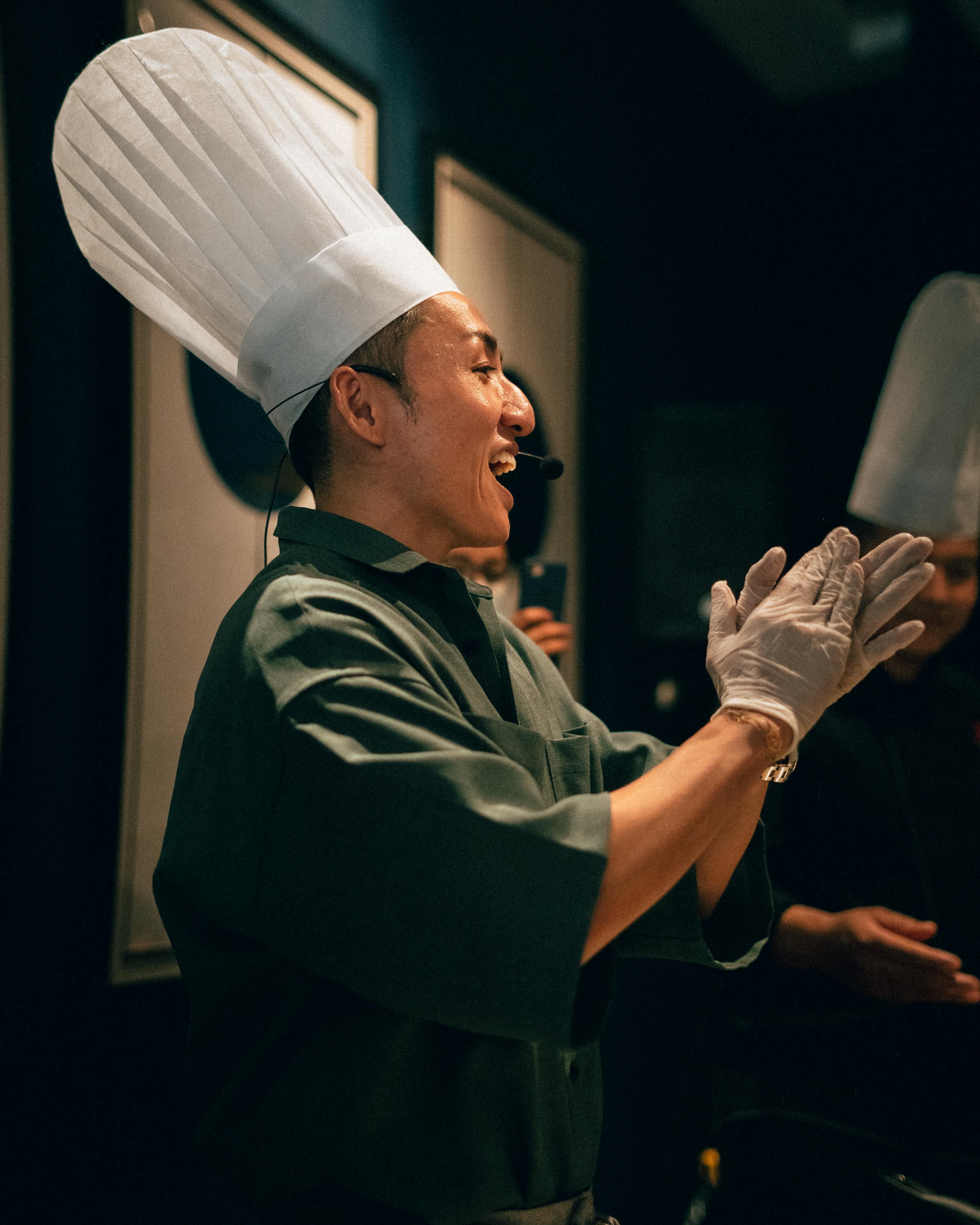 Restaurant Chef Standing and Clapping his Hands · Free Stock Photo
