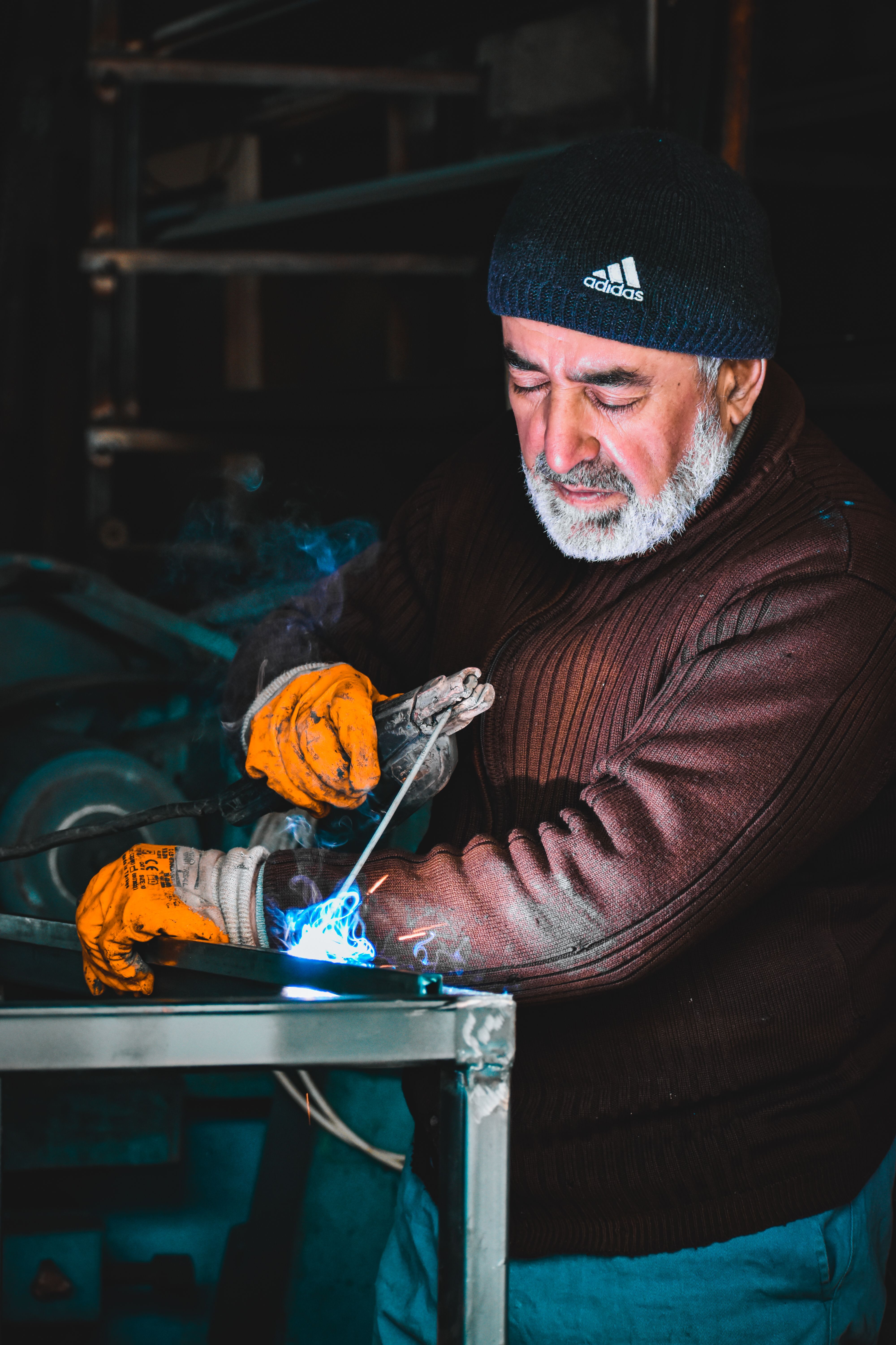 Man Sitting and Grinding · Free Stock Photo