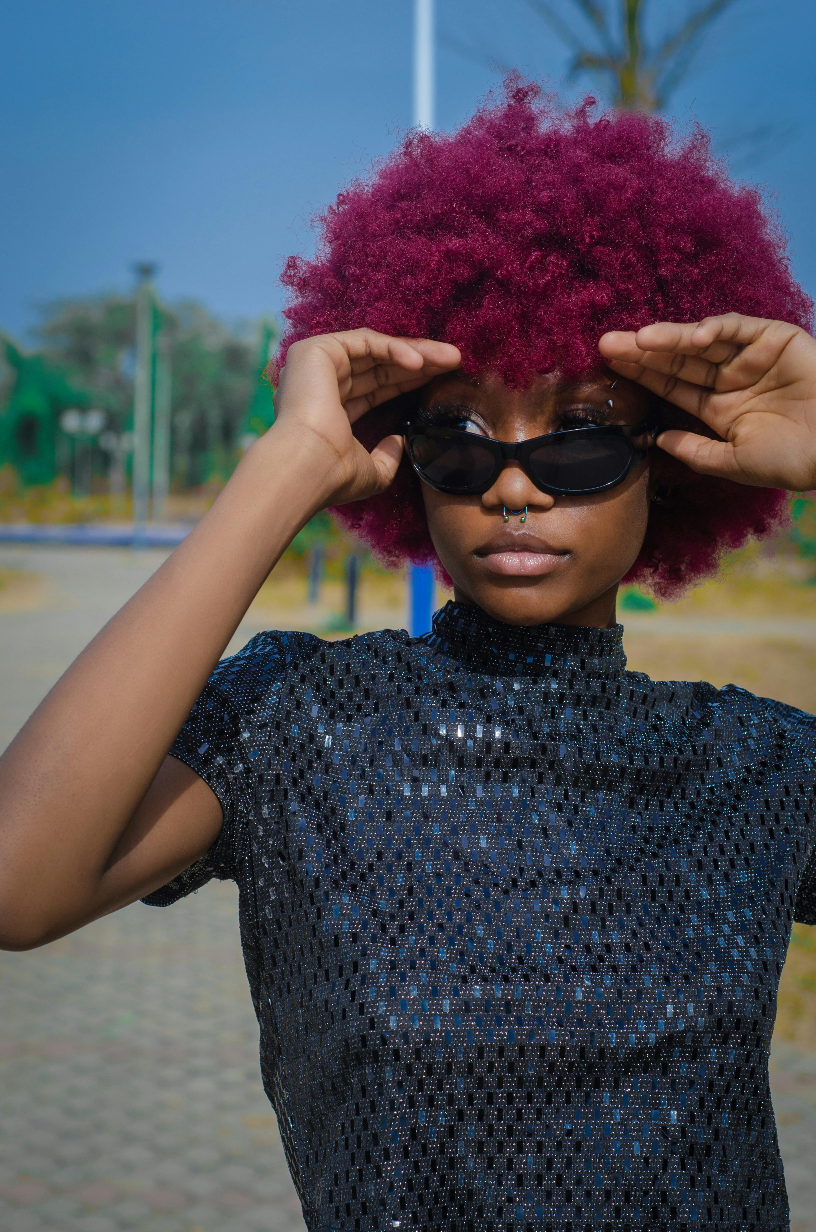 Woman with Pink Afro Hair with Sunglasses Outdoors · Free Stock Photo