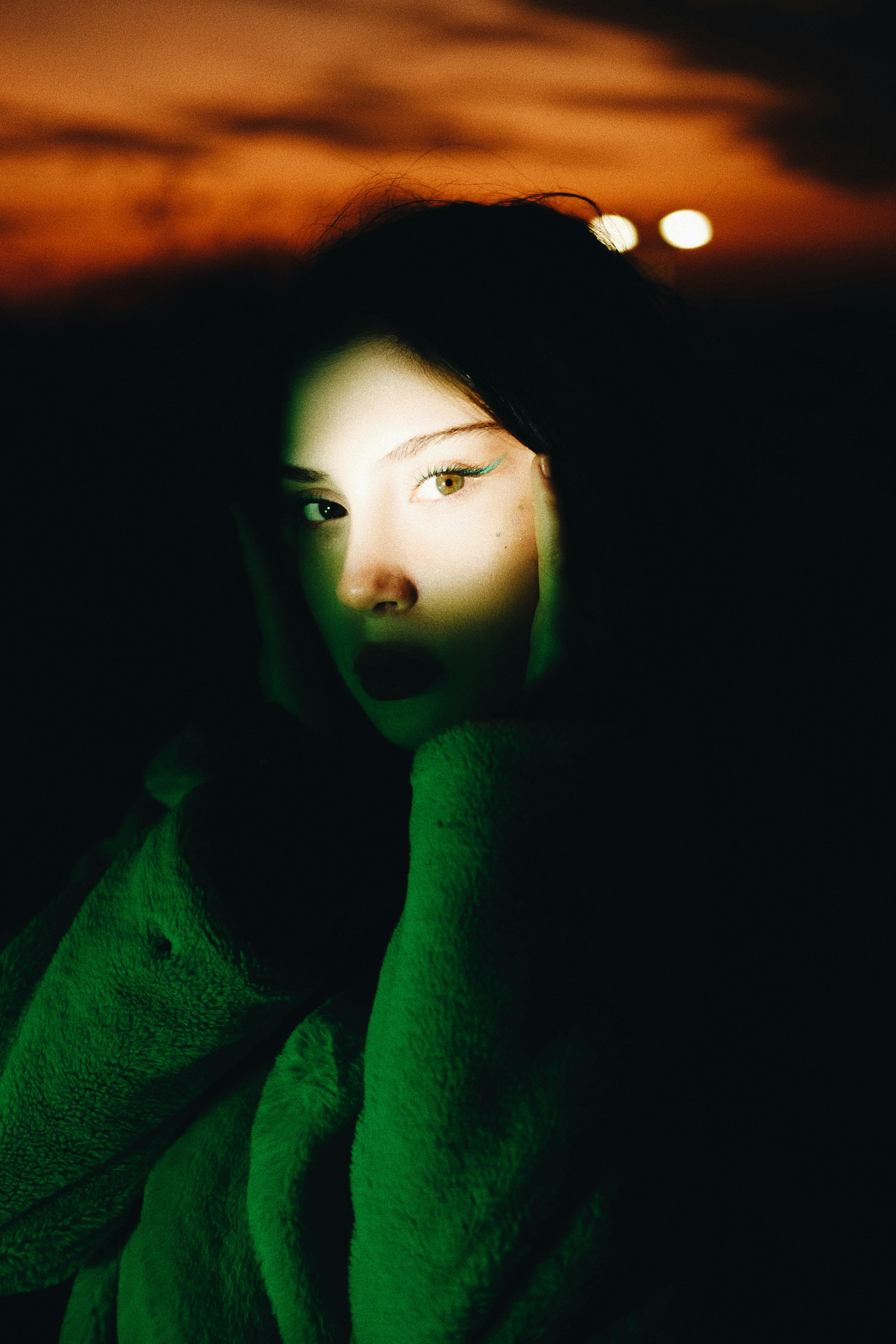 Light on Face of Woman Posing for Portrait at Dusk · Free Stock Photo