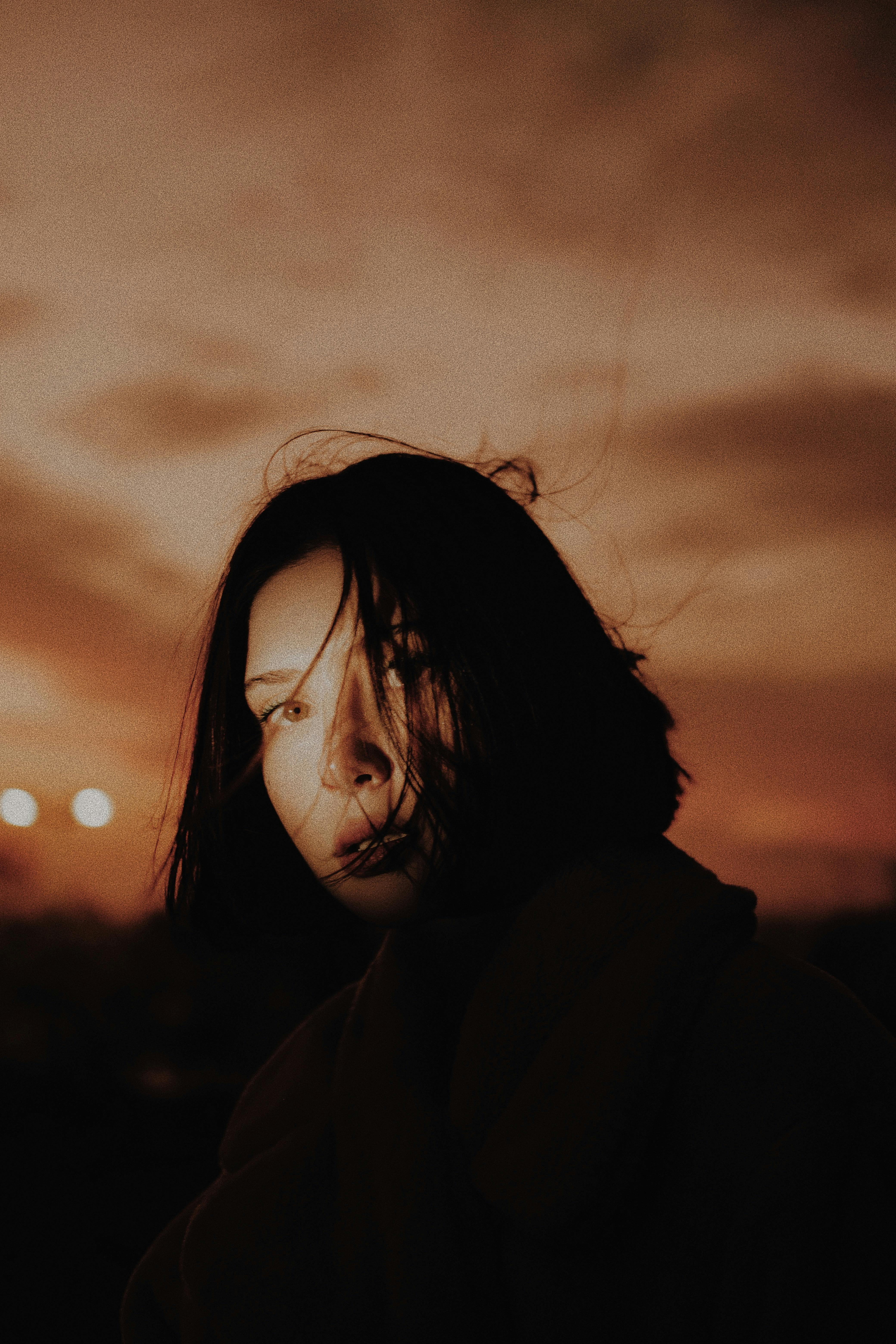 Woman Portrait at Dusk · Free Stock Photo