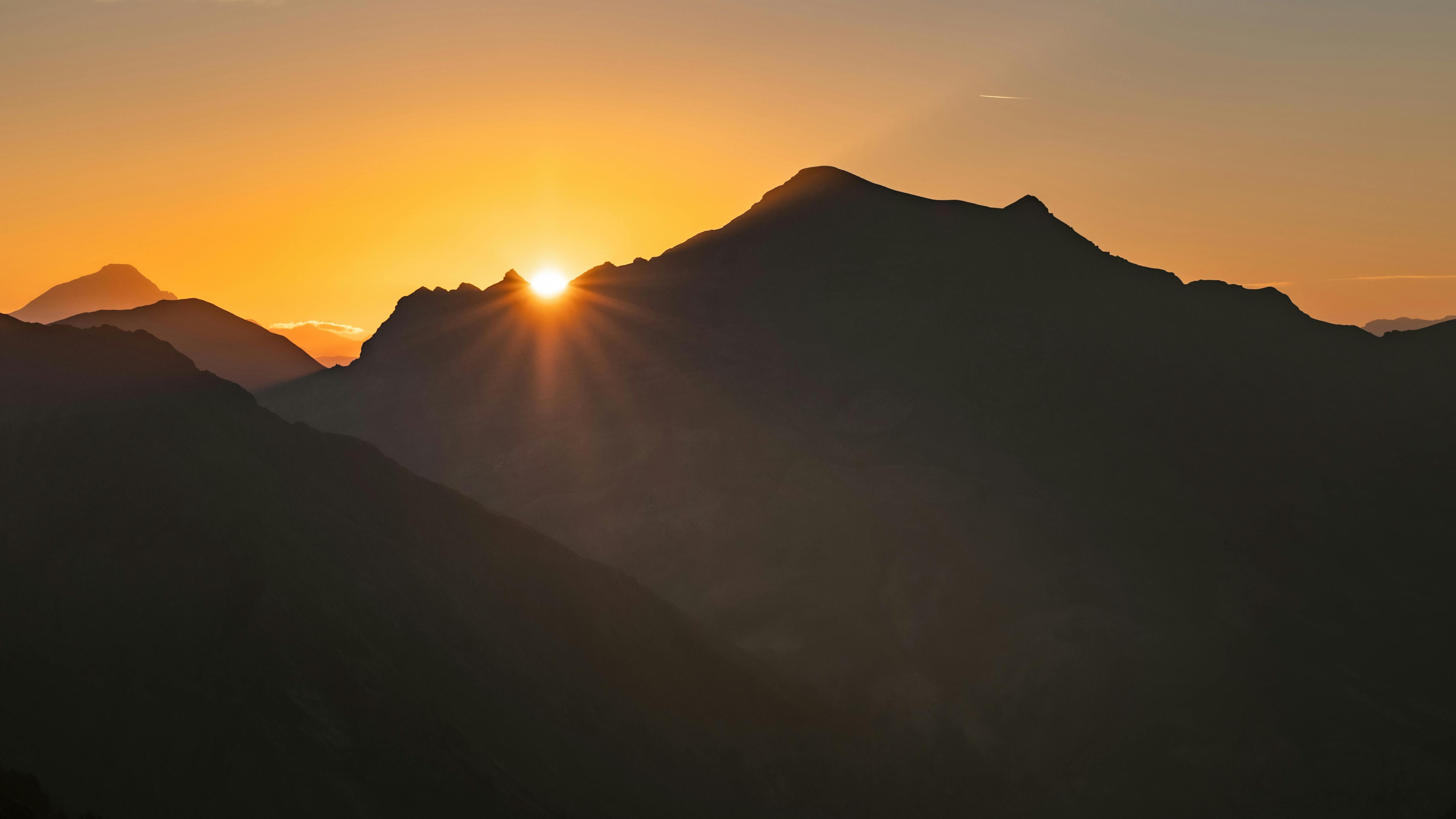Sunset Sunlight behind Mountains · Free Stock Photo