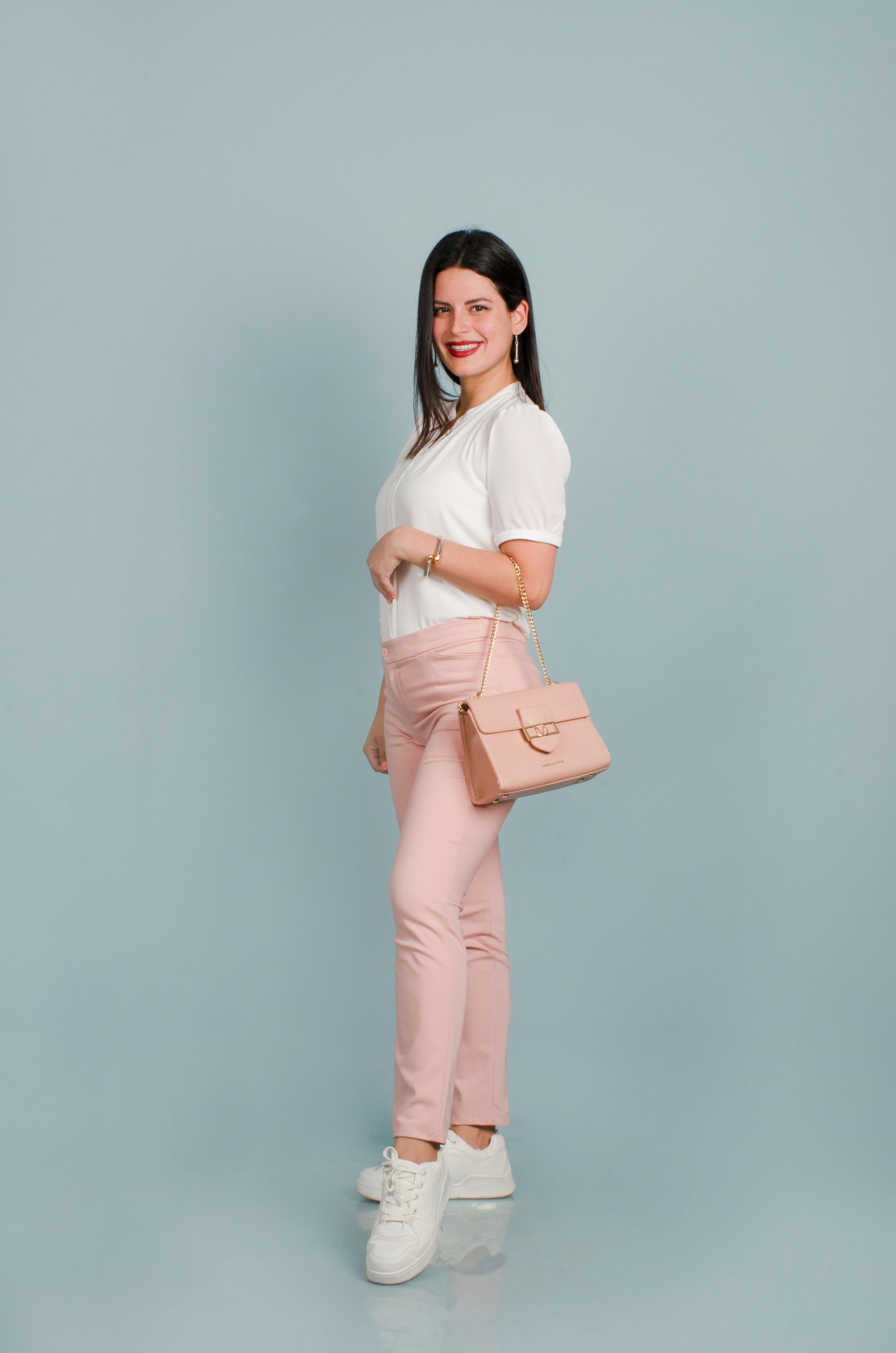 Studio Shot of a Young Woman in a Simple and Elegant Outfit · Free ...