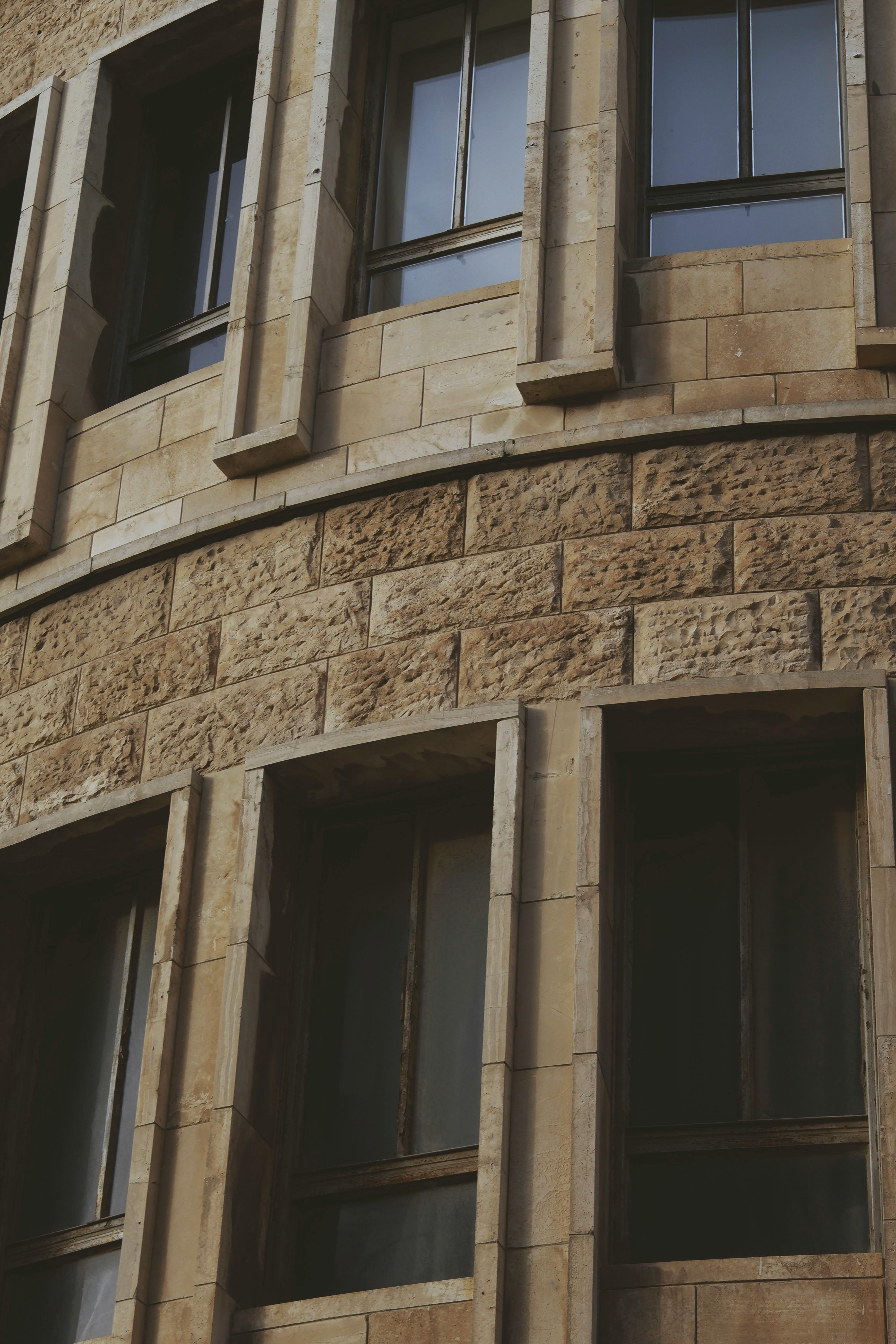 Windows of Bedrock Office Building · Free Stock Photo